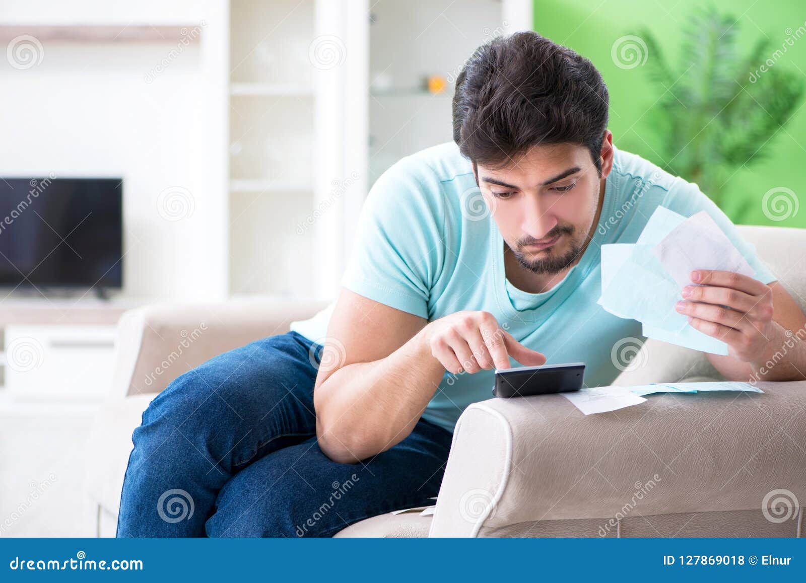 The Young Man Struggling with Personal Finance and Bills Stock Photo ...