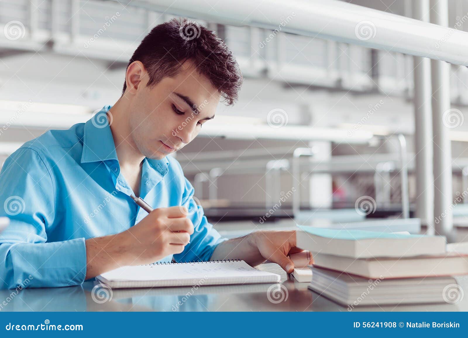 Young Man Student Learning Taking Notes at Library Stock Photo - Image ...