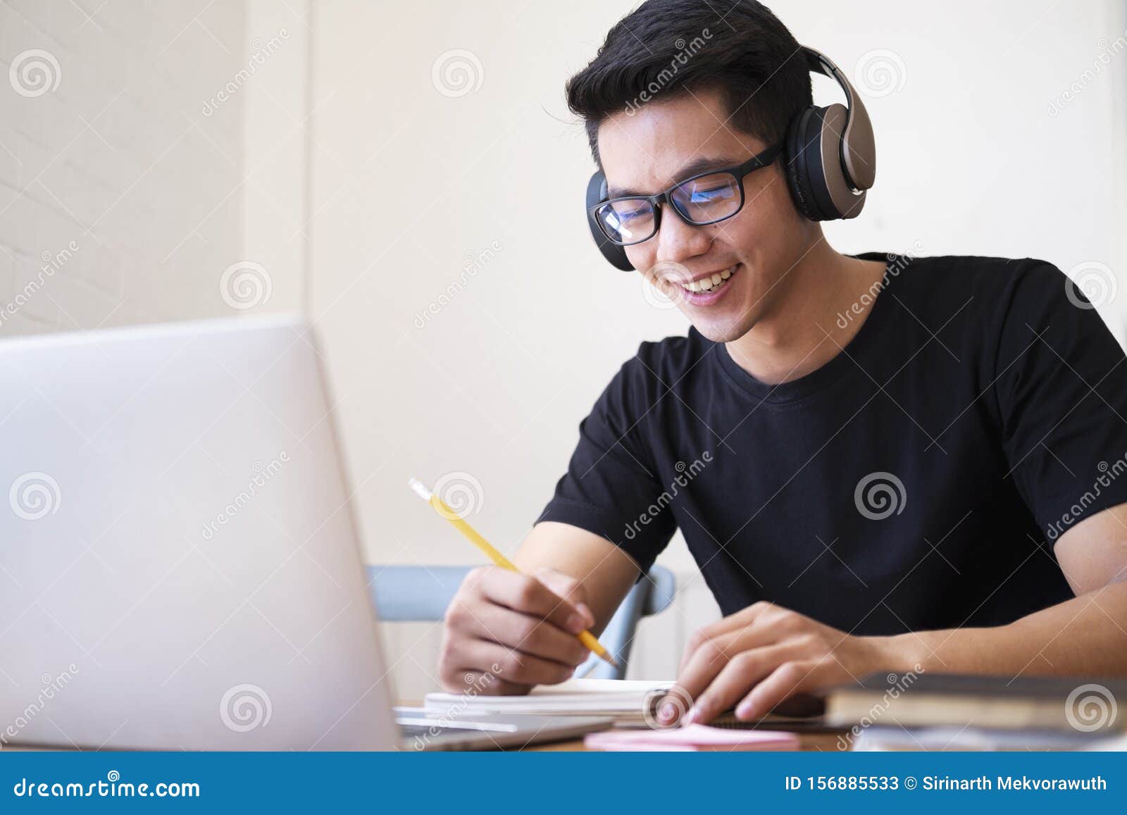 Young Man Student Study at Home Using Laptop and Learning Online Stock ...