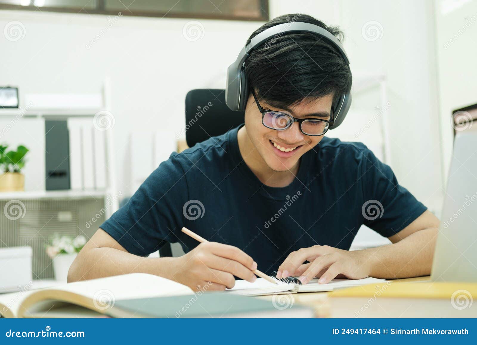 Young Man Study in Front of the Laptop Computer at Home Stock Photo ...