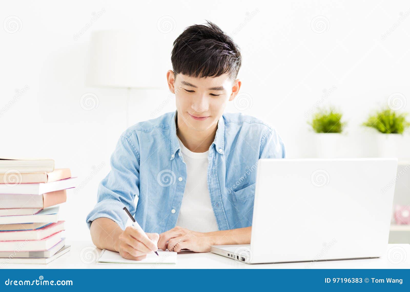 Young Man Studying in Living Room Stock Image - Image of chinese ...