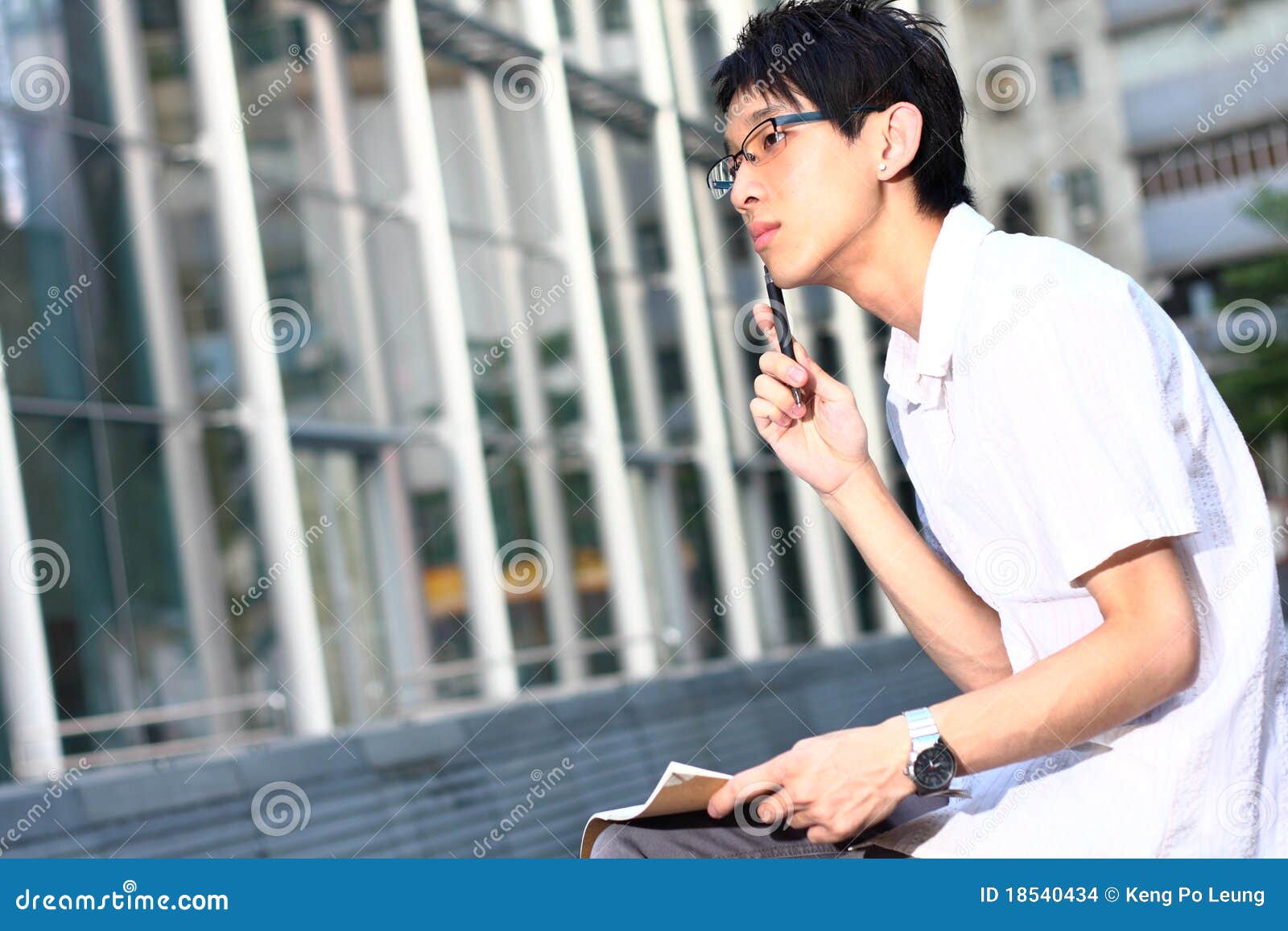 Young Man Studying at Outdoor Stock Photo - Image of building, person ...