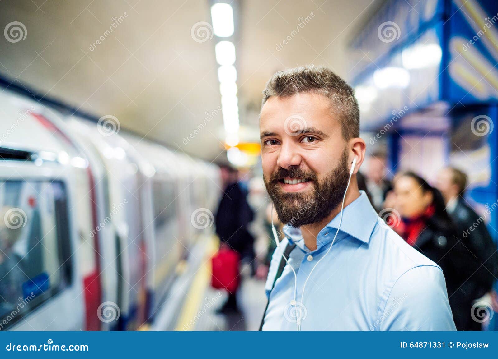 Young man in subway stock image. Image of earphones, lifestyle - 64871331