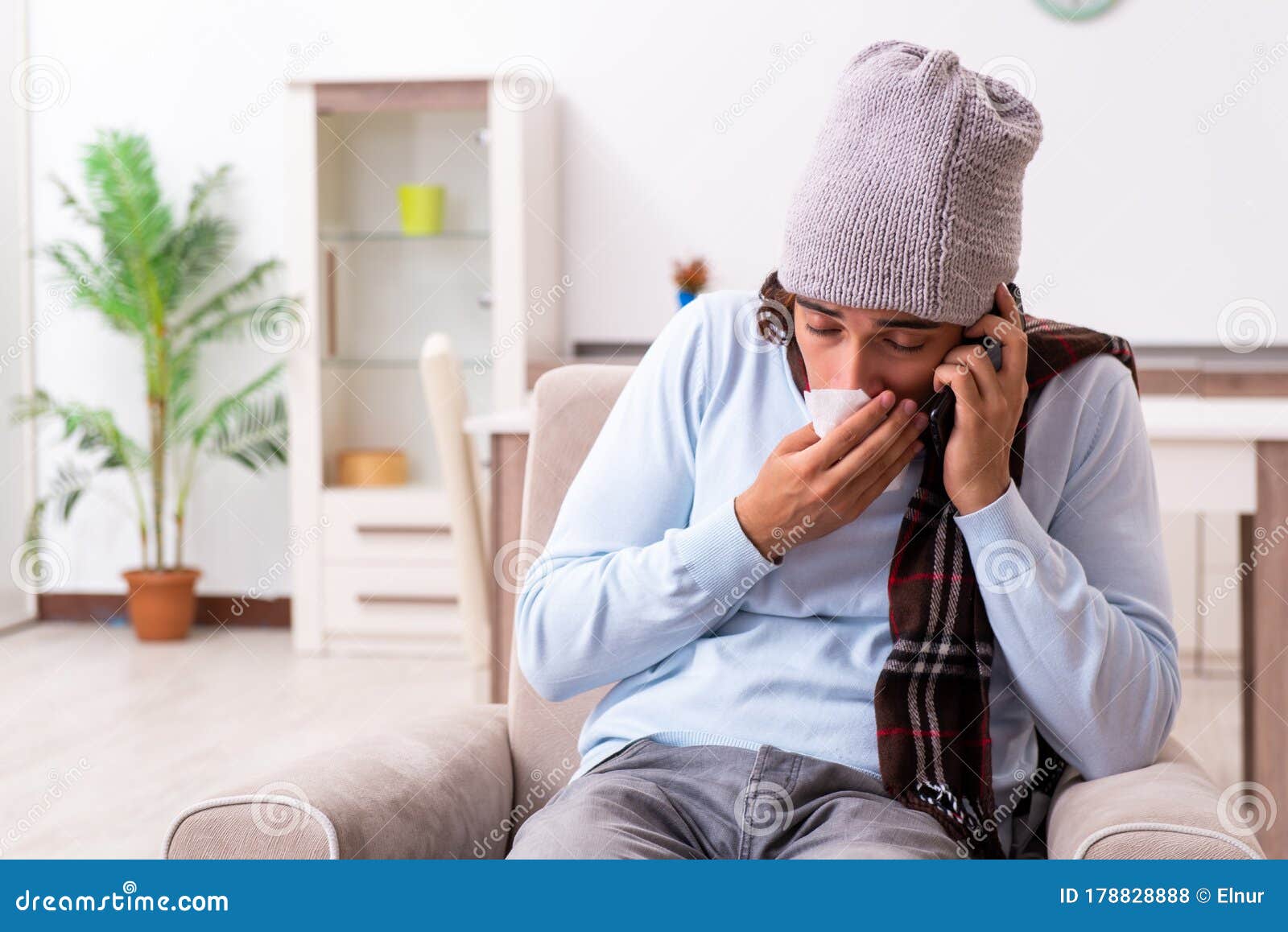 Young Man Suffering from Flu at Home Stock Photo - Image of phone ...