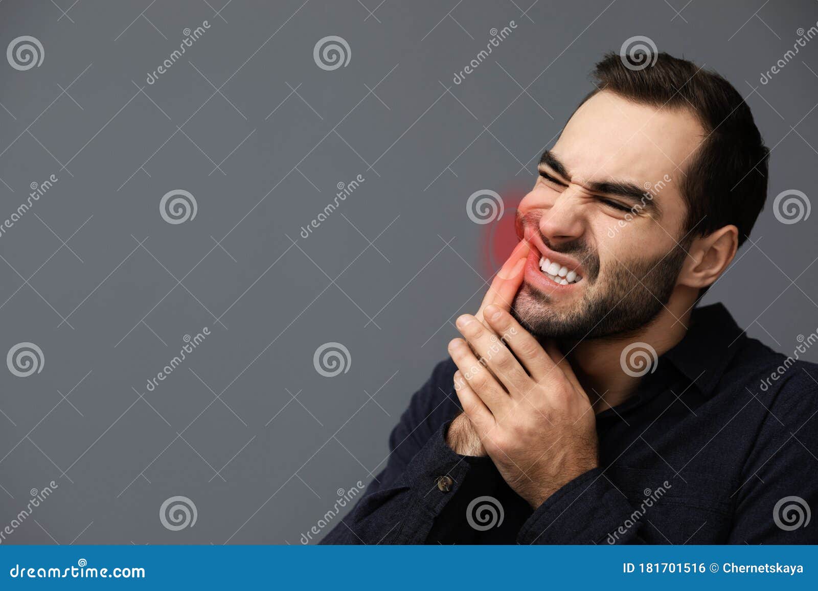 Young Man Suffering from Toothache on Background, Space for Text Stock ...