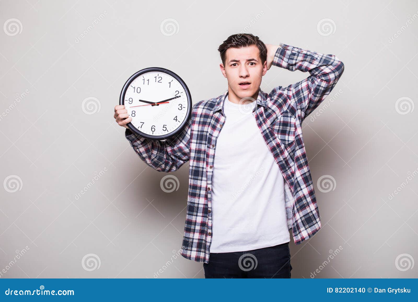 Young Man in Suit with Clock in Hands Miss Something Stock Photo ...
