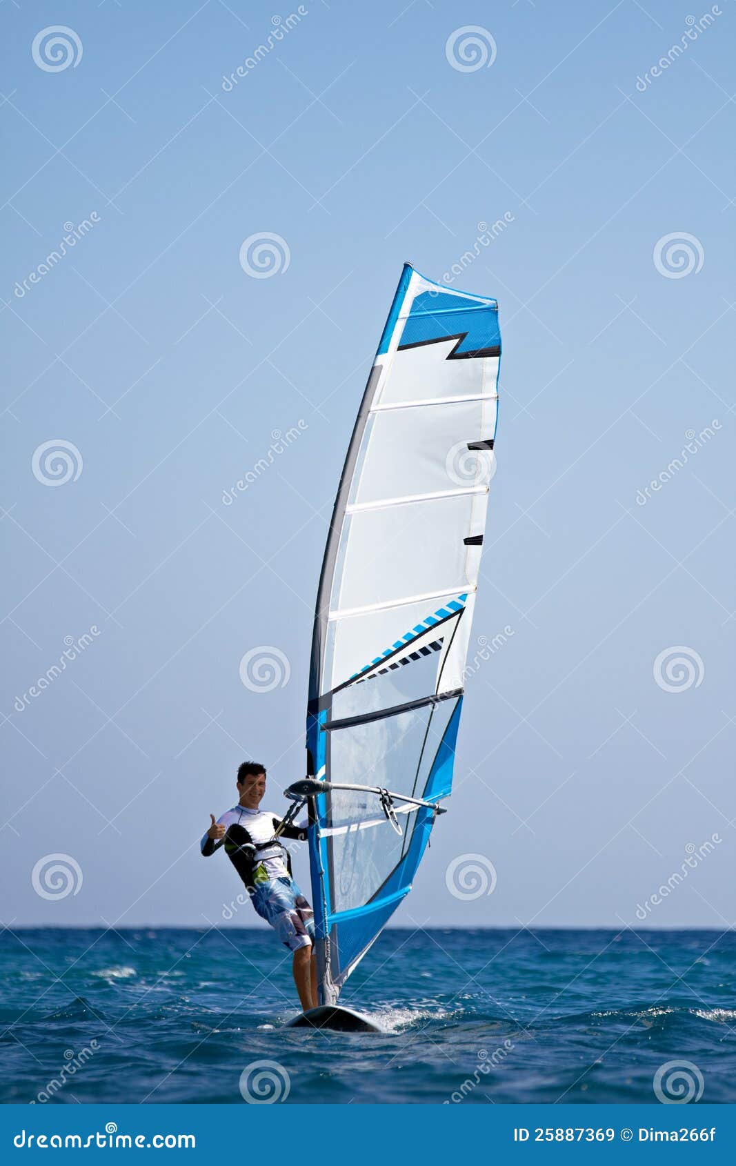 Young man surfing the wind stock image. Image of surfing - 25887369