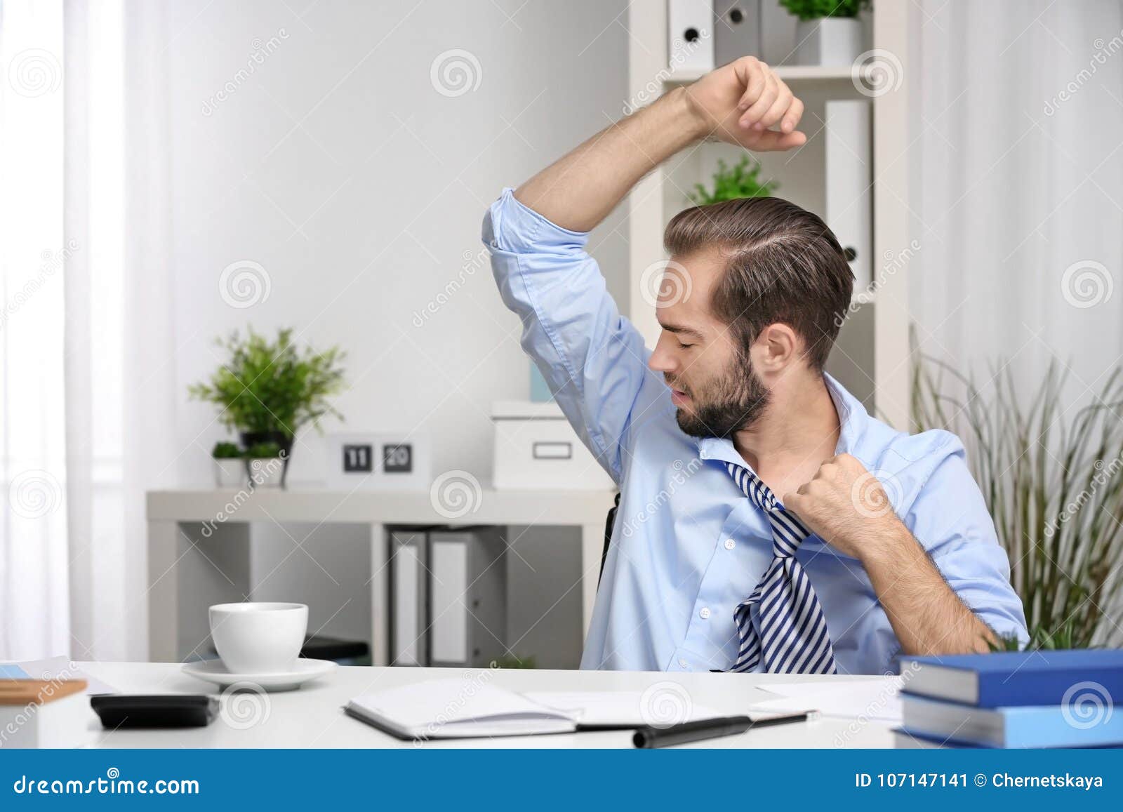 Young man sweating stock image. Image of stuffy, inside - 107147141