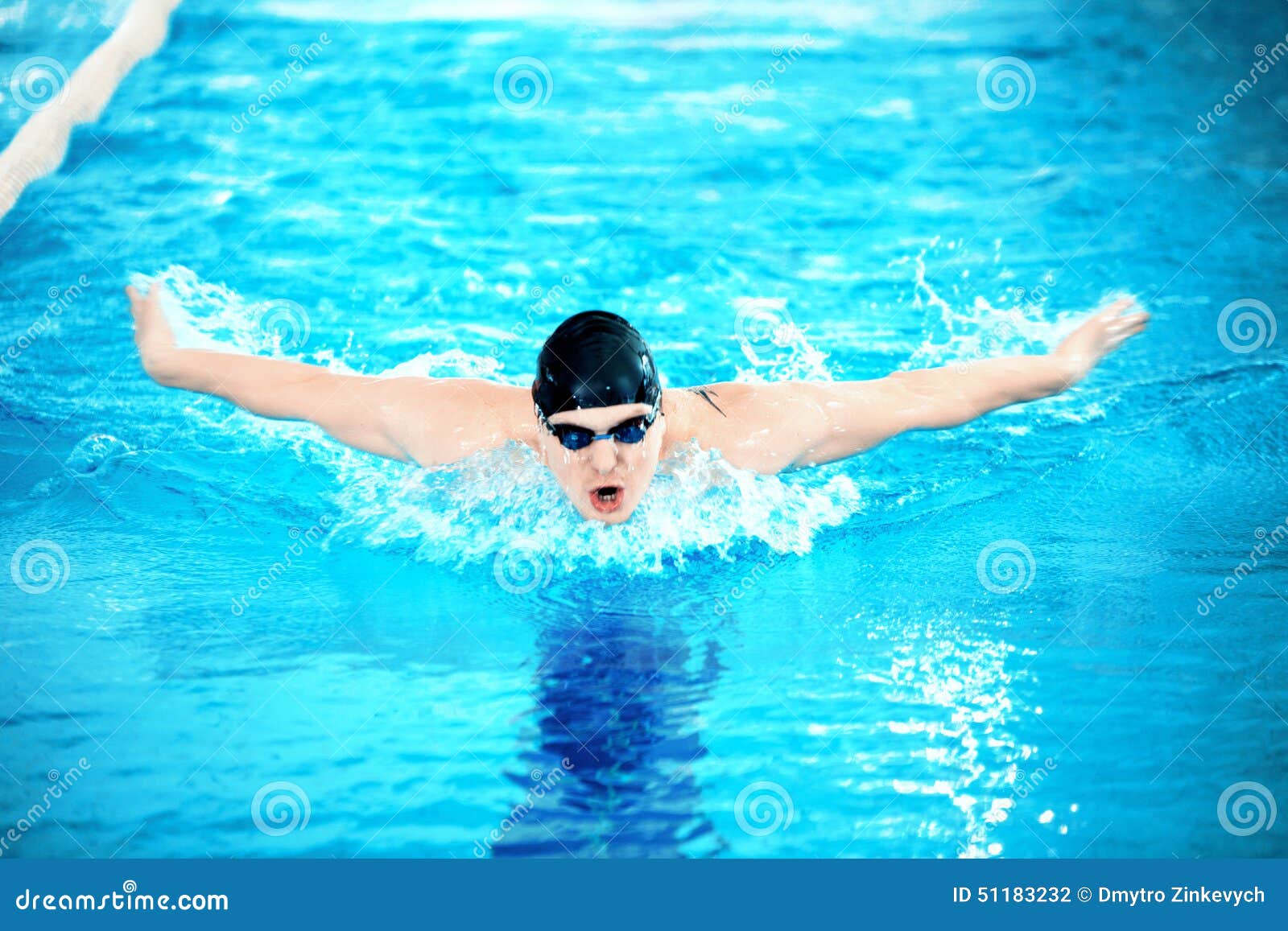 Young man in swimming pool stock photo. Image of front - 51183232