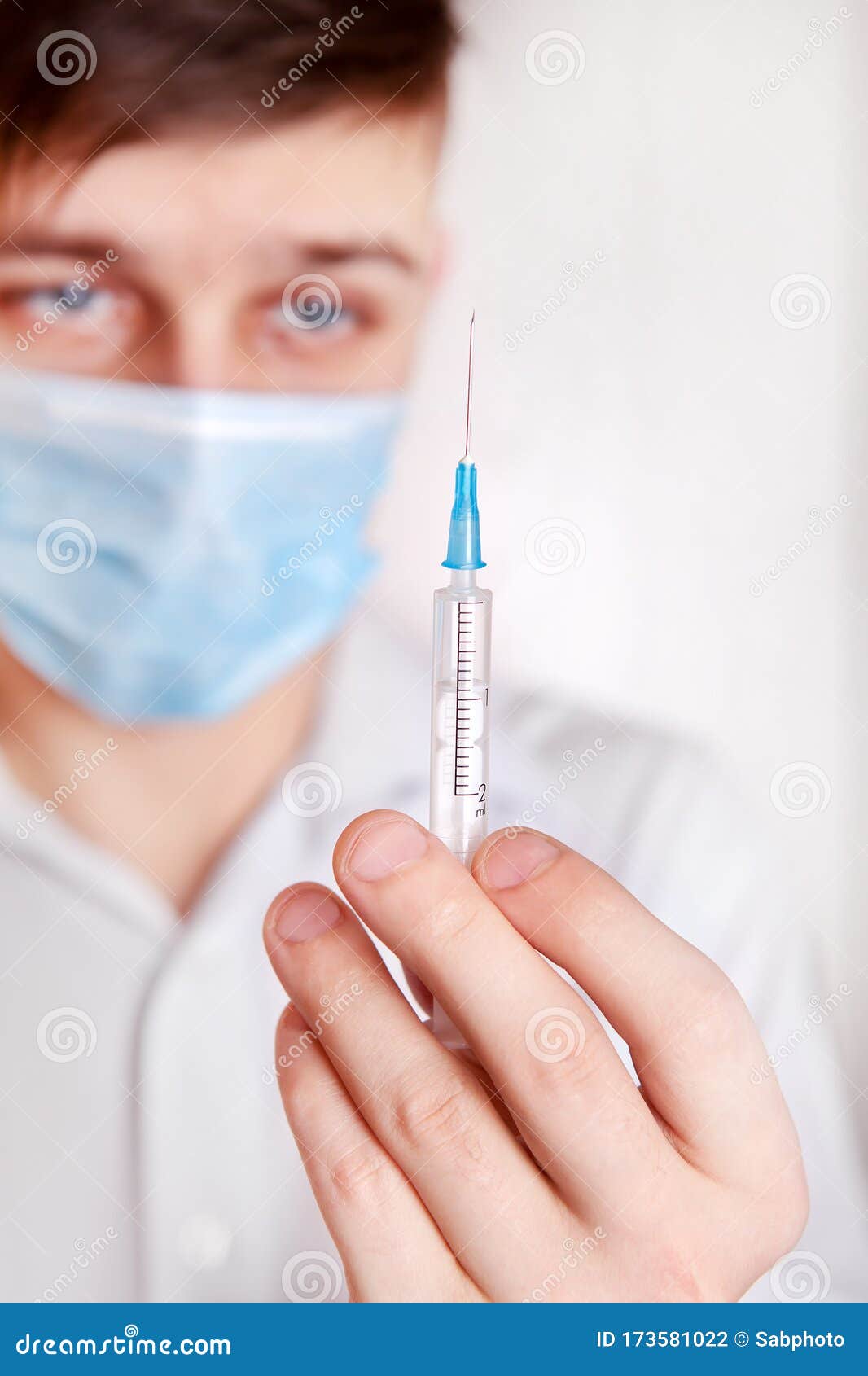 Young Man with a Syringe stock photo. Image of needle - 173581022