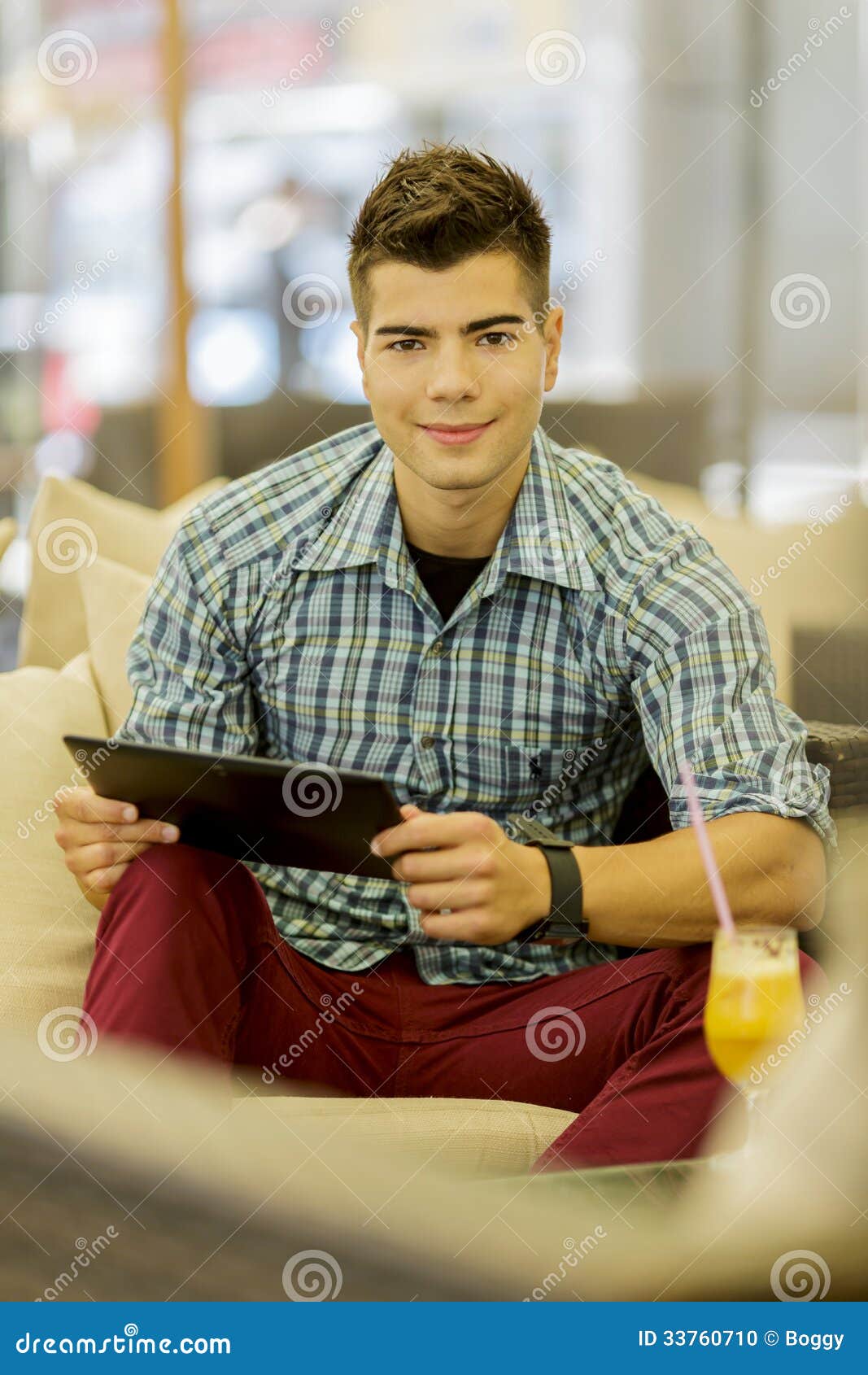 Young man with tablet stock photo. Image of networking - 33760710