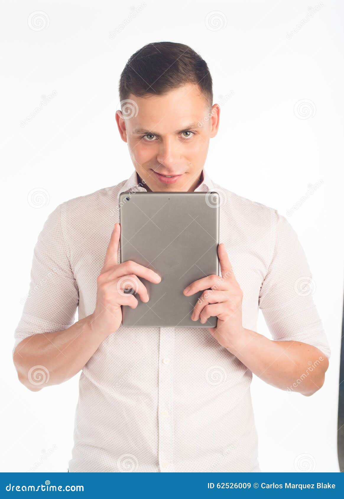 Young man with tablet stock image. Image of showing, camera - 62526009