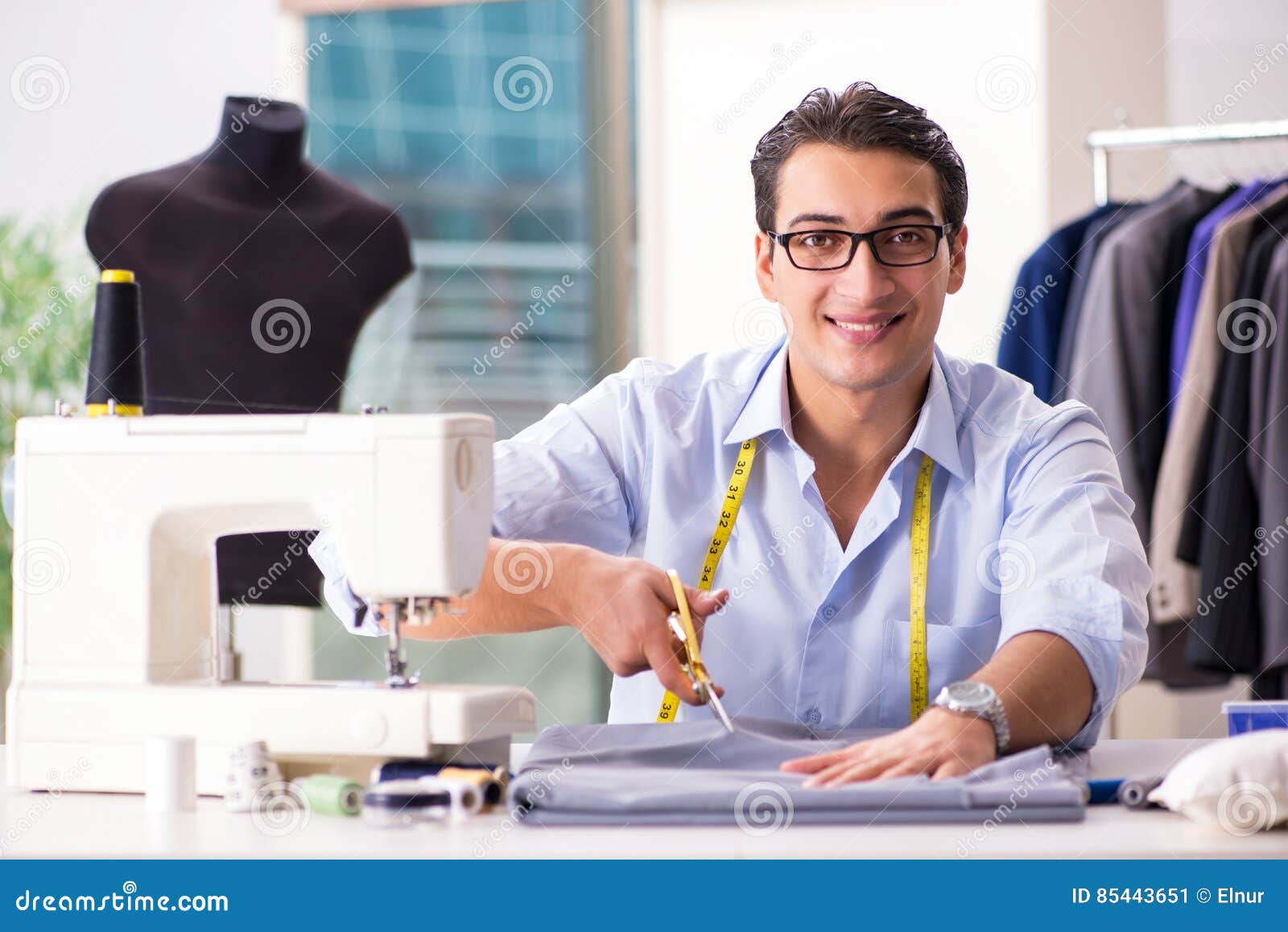 The Young Man Tailor Working on New Clothing Stock Image - Image of ...