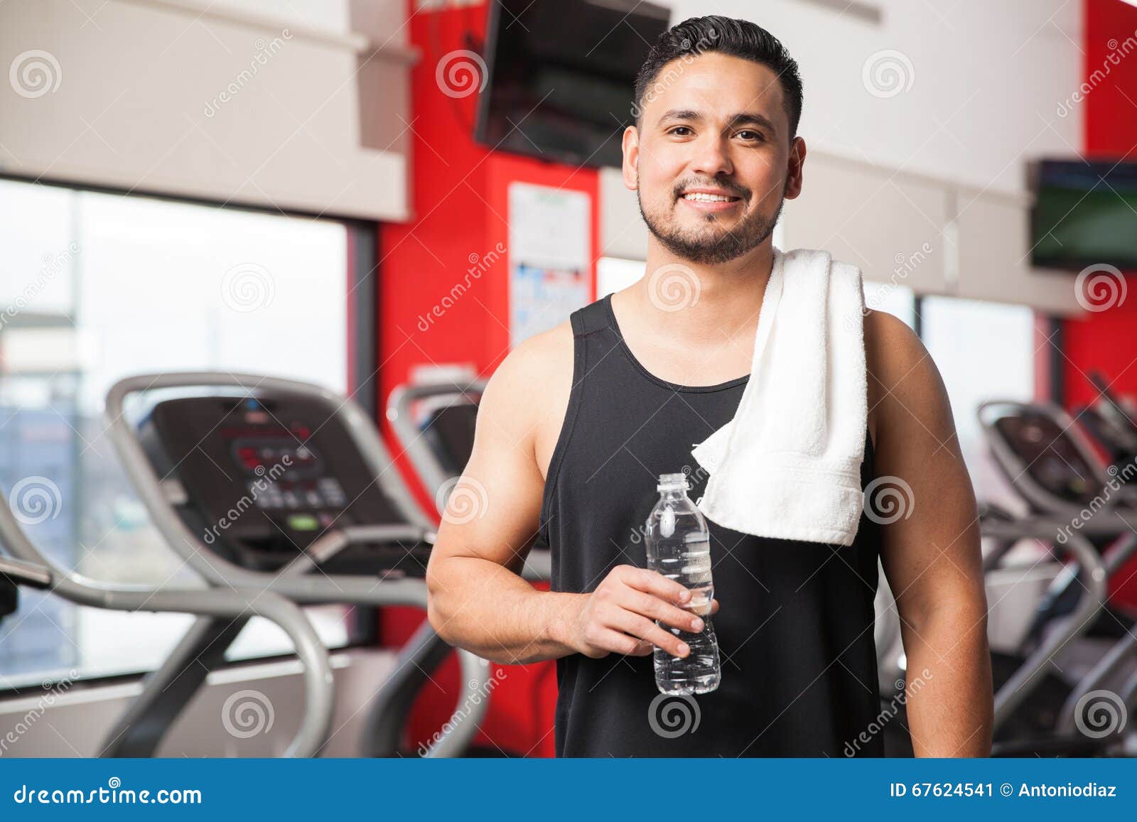 Young Man Taking a Break at the Gym Stock Image - Image of sporty ...