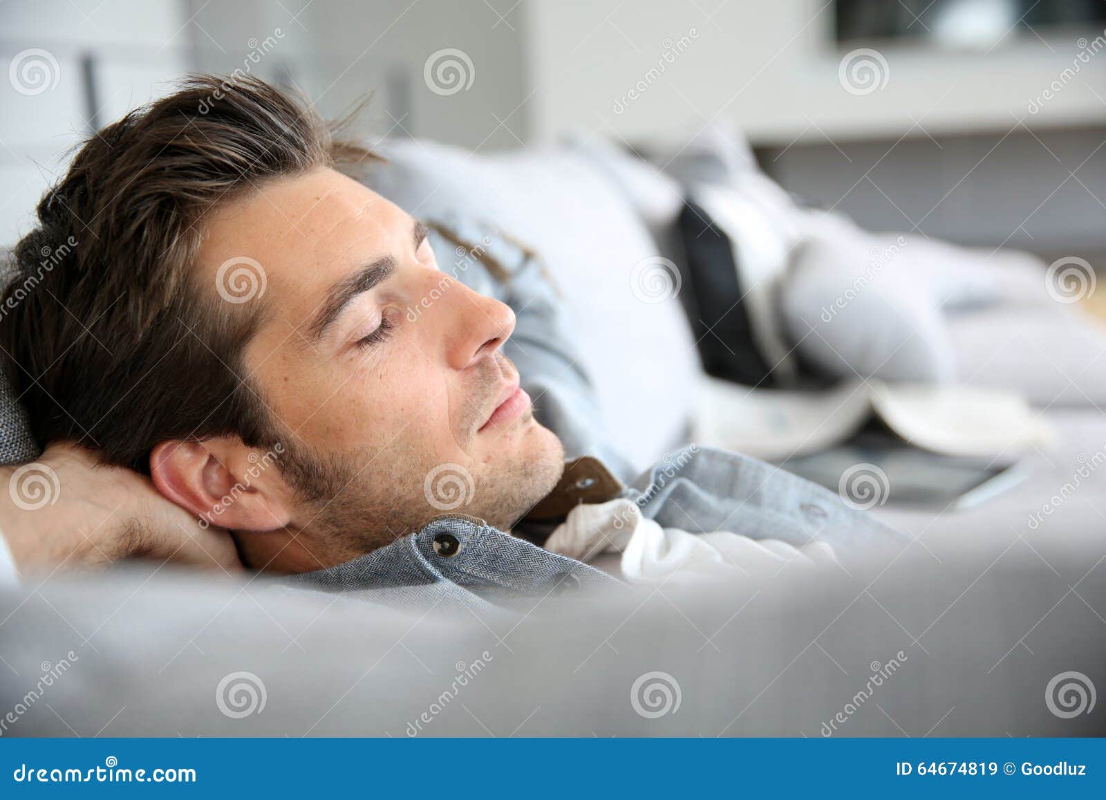 Young Man Taking a Nap at Home Stock Image - Image of casual, living ...