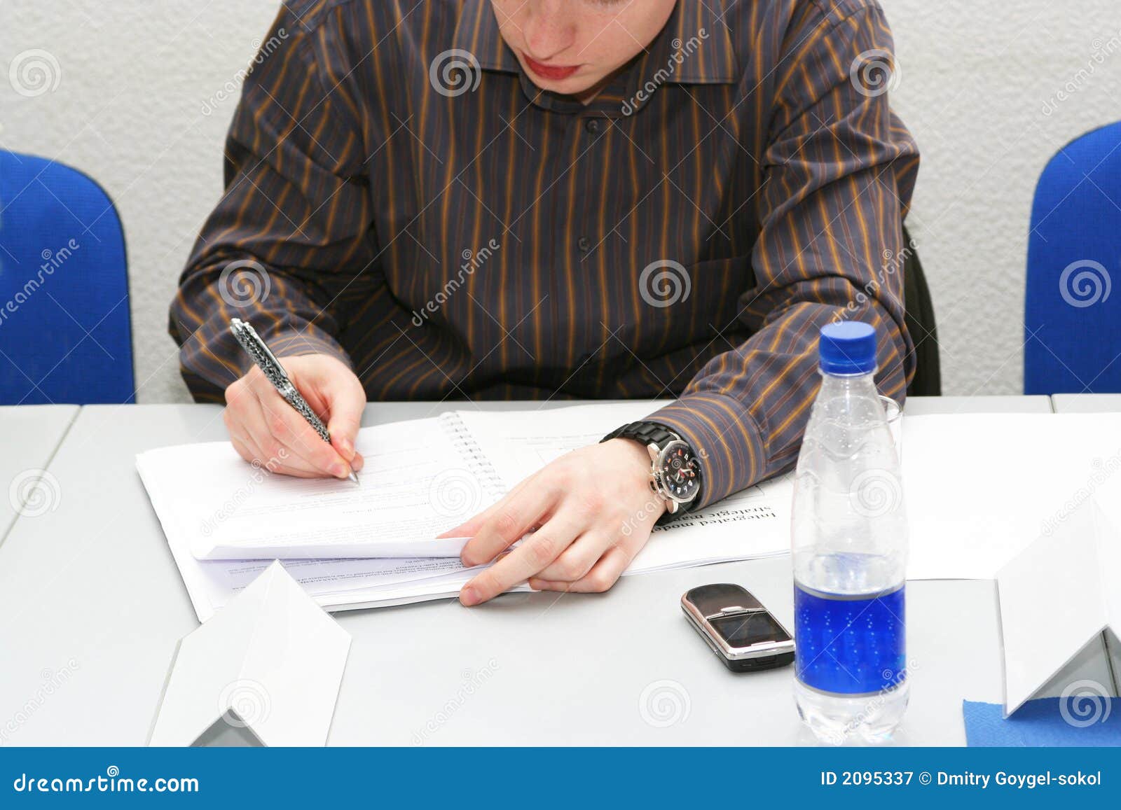 Young Man Taking Notes at the Boardroom Stock Image - Image of adult ...