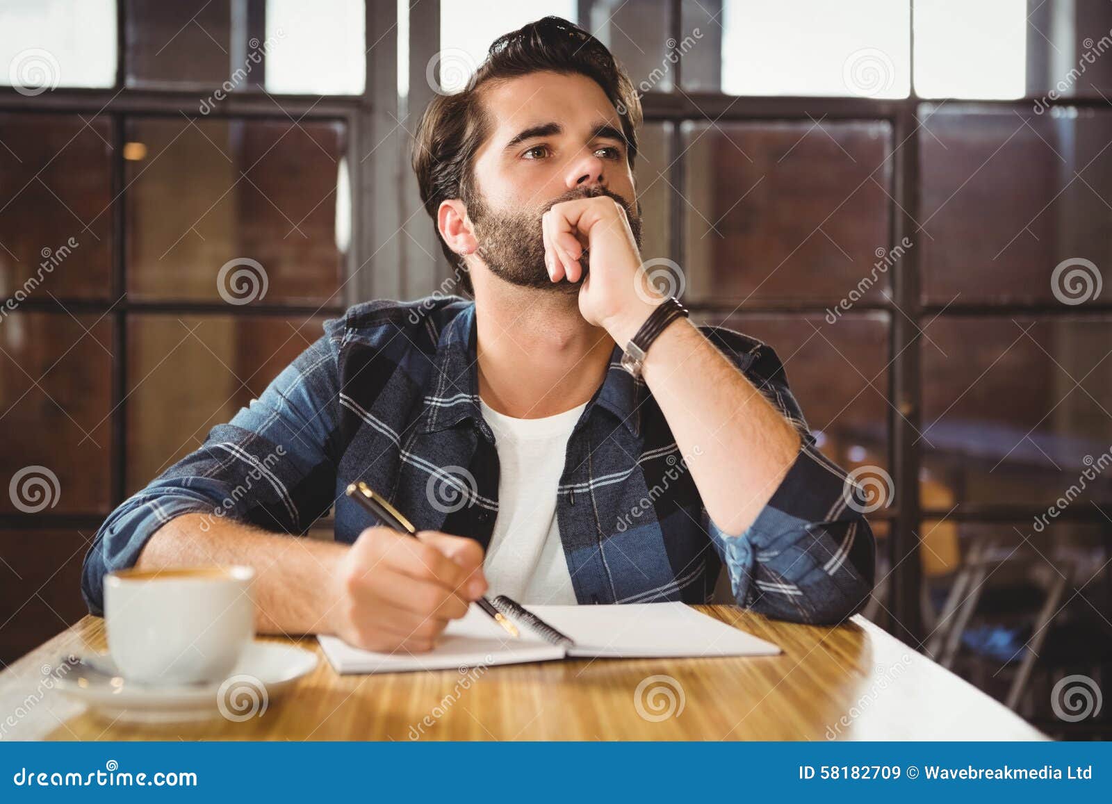Young Man Taking Notes in His Notebook Stock Image - Image of male ...