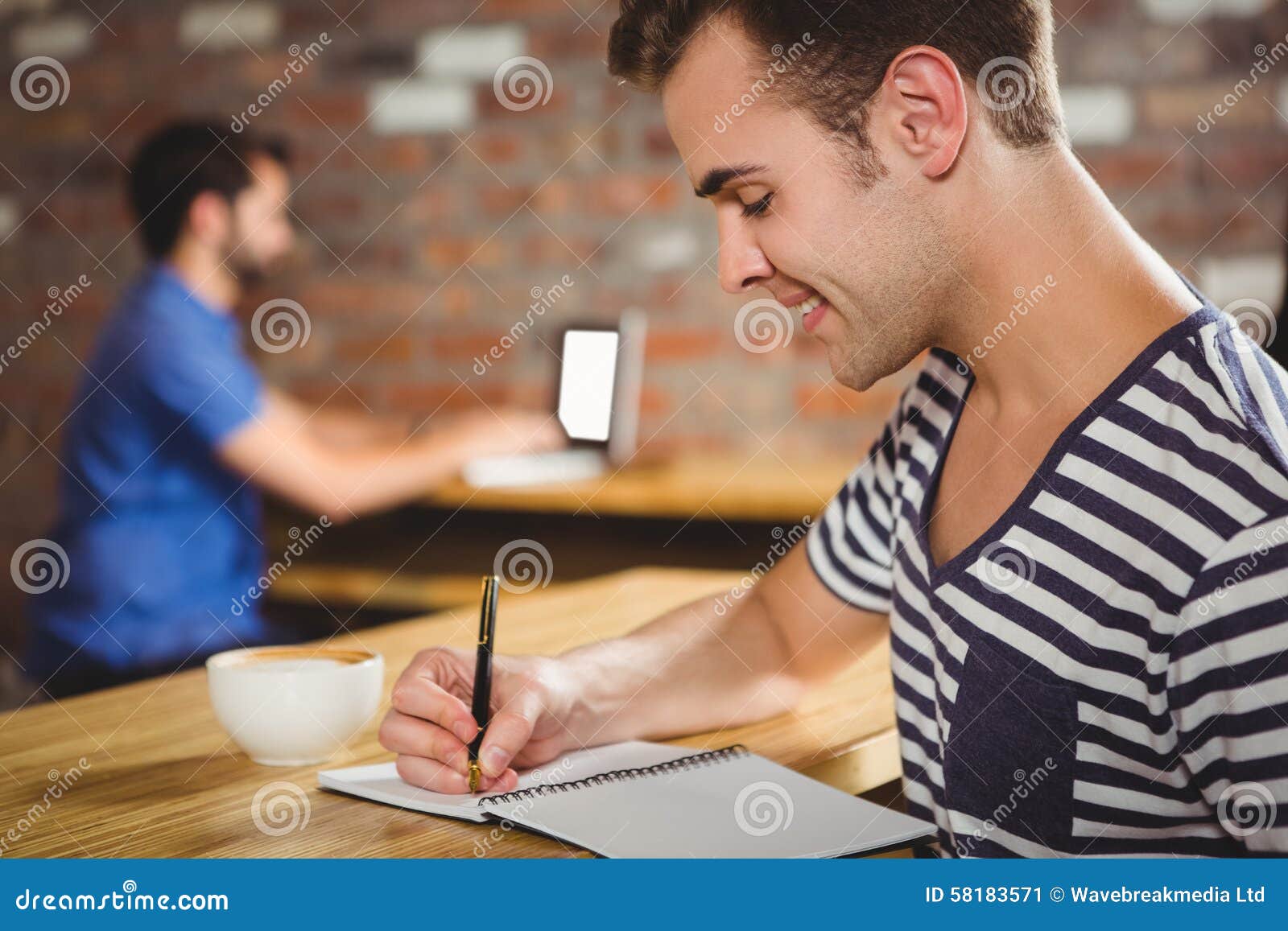 Young Man Taking Notes in His Notebook Stock Image - Image of note ...