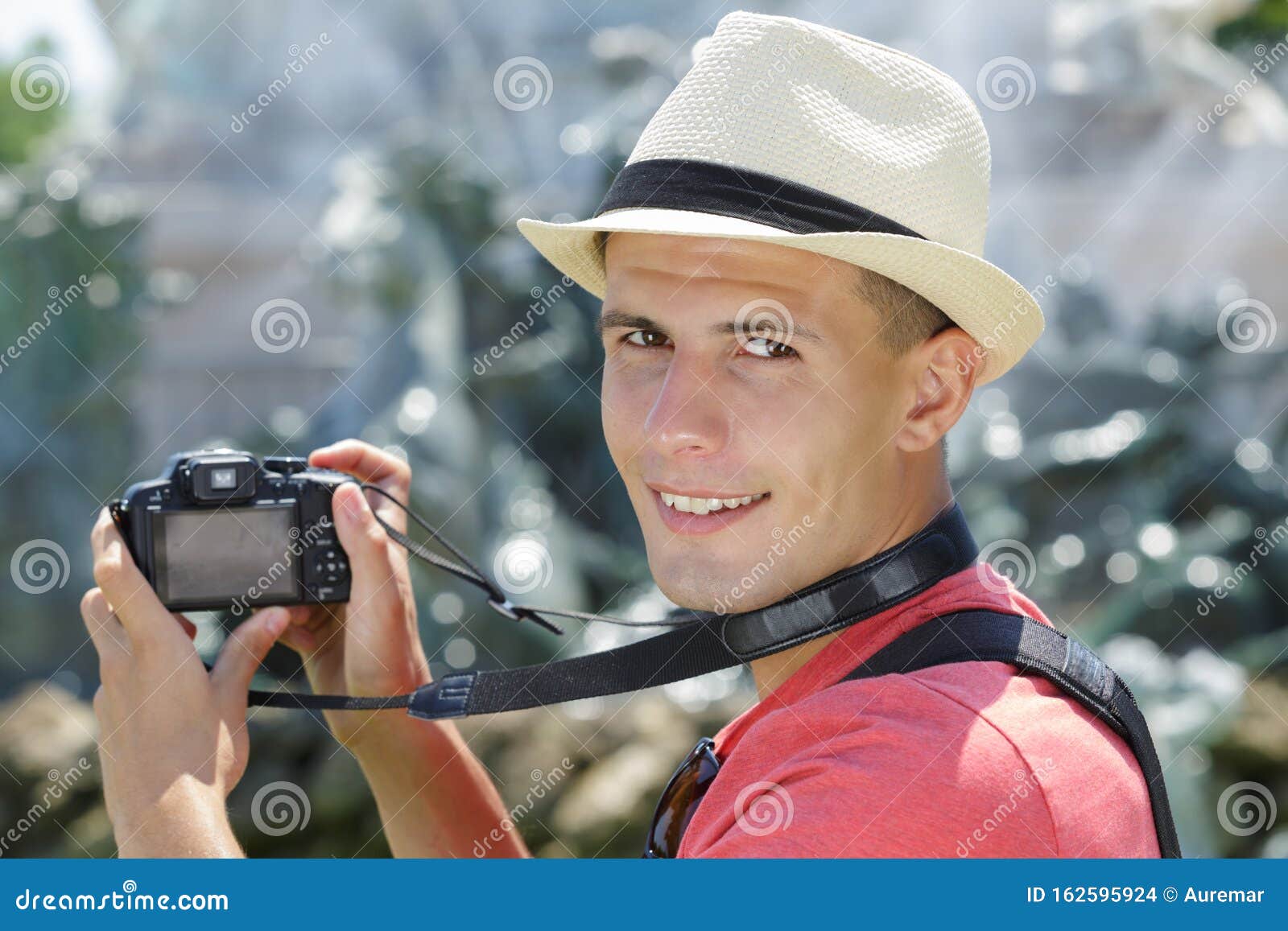 Young man taking photo stock photo. Image of hands, girl - 162595924
