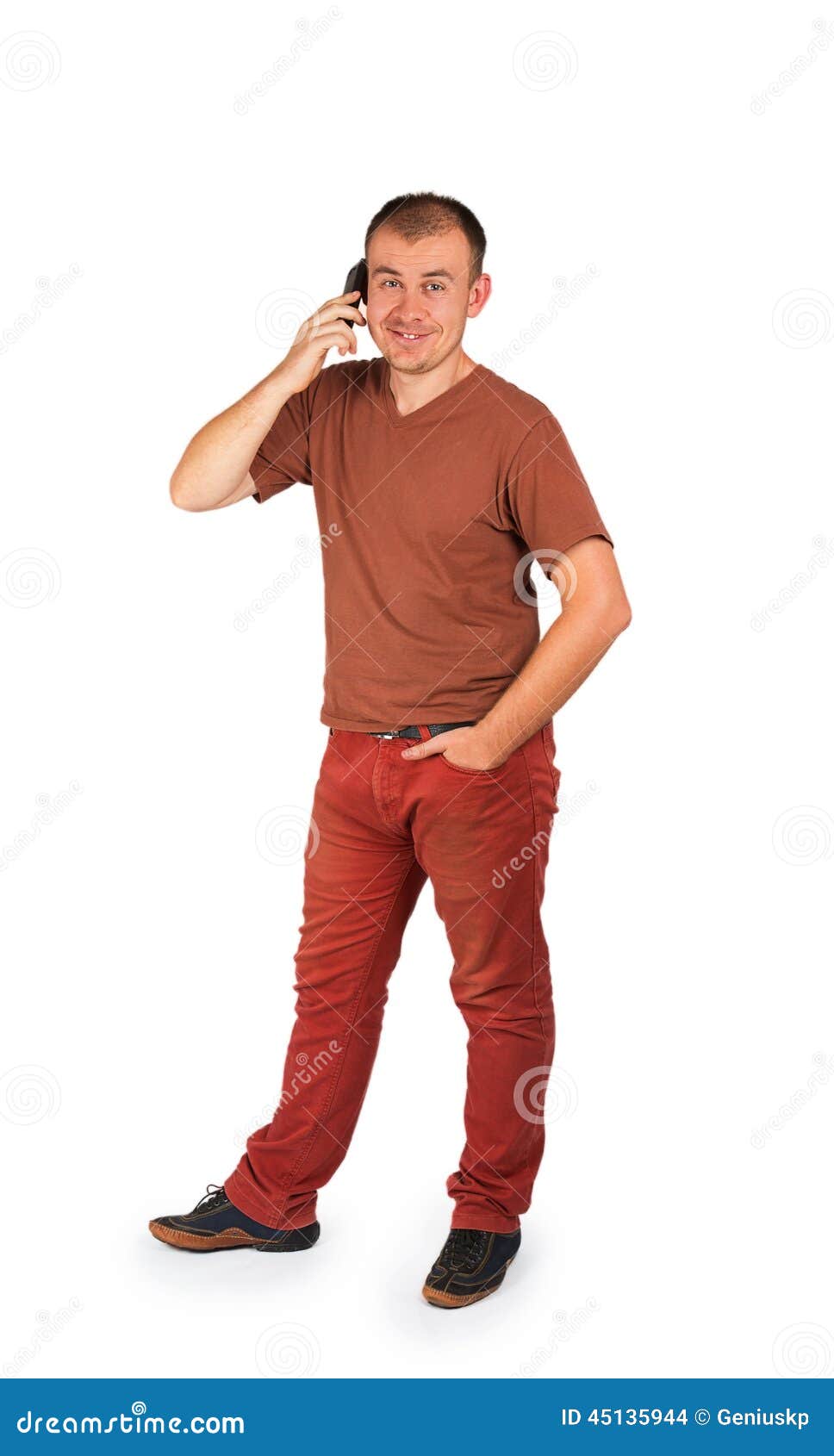 Young Man Talking on a Mobile Phone and Smiling Stock Photo - Image of ...