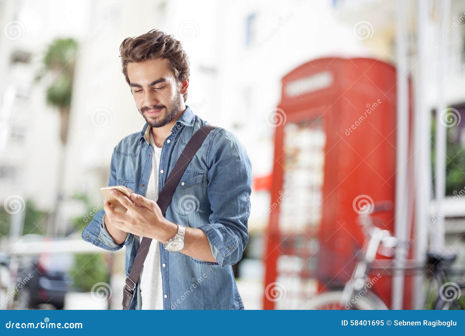 Young Man Talking Mobile Phone in Street Stock Image - Image of ...