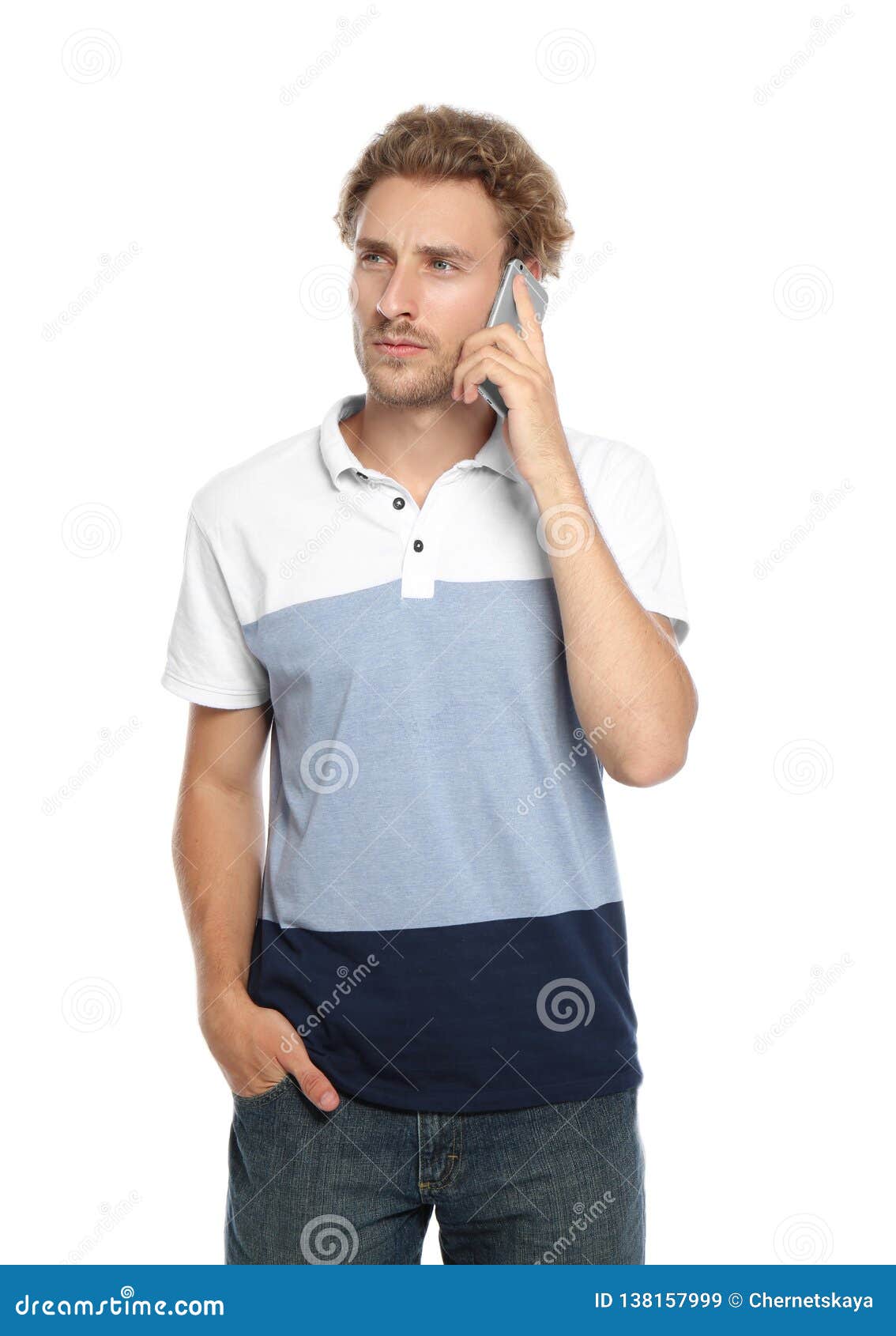 Young man talking on phone stock image. Image of attractive - 138157999