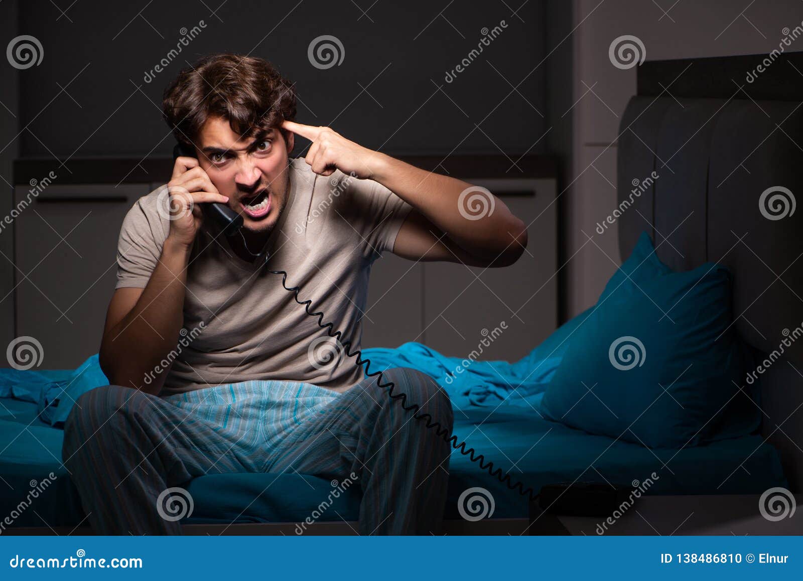The Young Man Talking on Phone in Bed Stock Photo - Image of lying ...