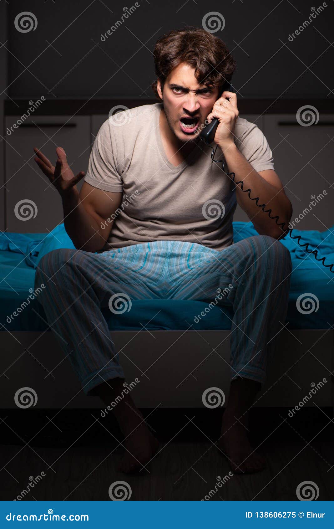 The Young Man Talking on Phone in Bed Stock Image - Image of phone ...
