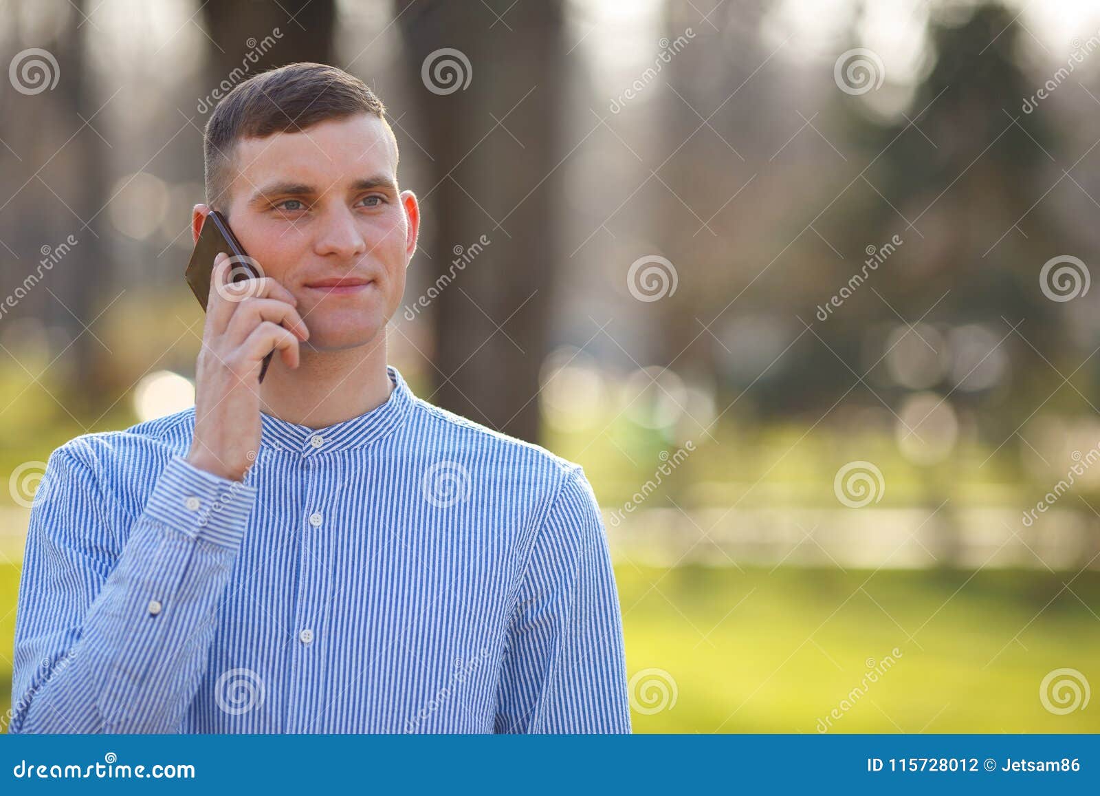 Young Man Talking on Smart Phone Outdoors. Conversation, People, Stock ...