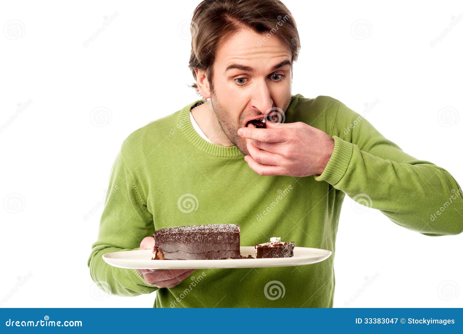 Young Man Tasting Chocolate Cake in Hurry Stock Image - Image of ...