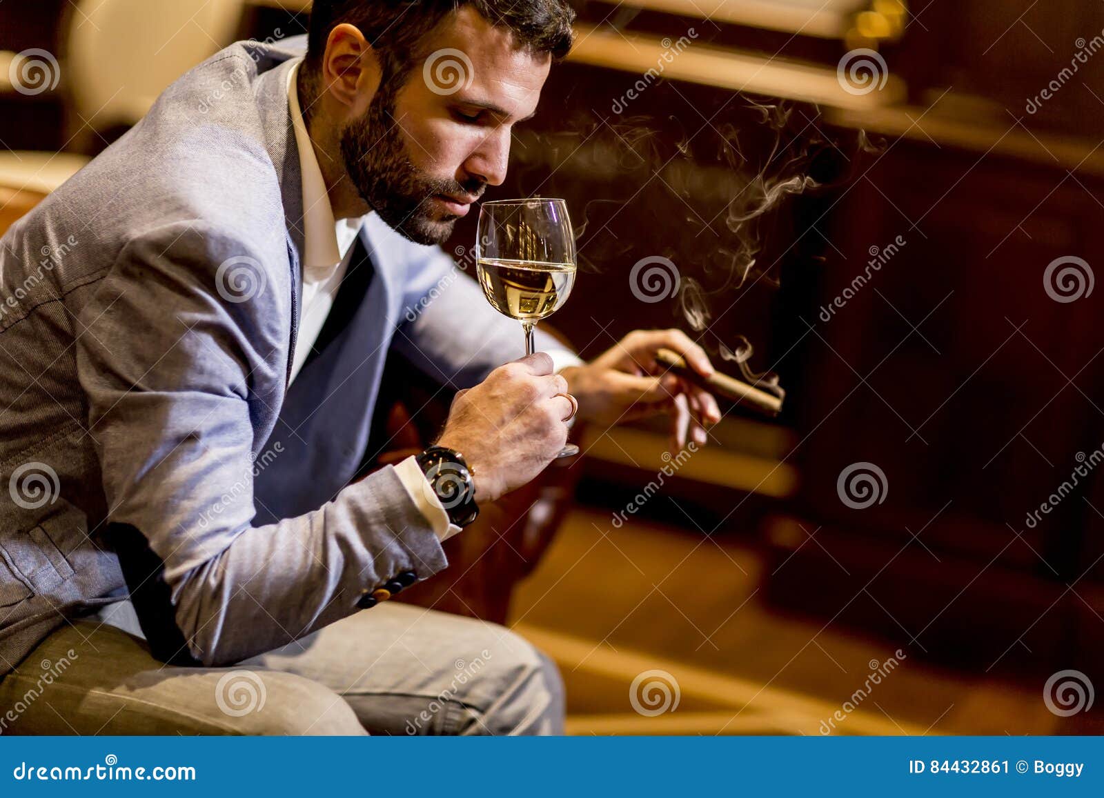 Young Man Tasting White Wine and Smoking Cigar Stock Image - Image of ...