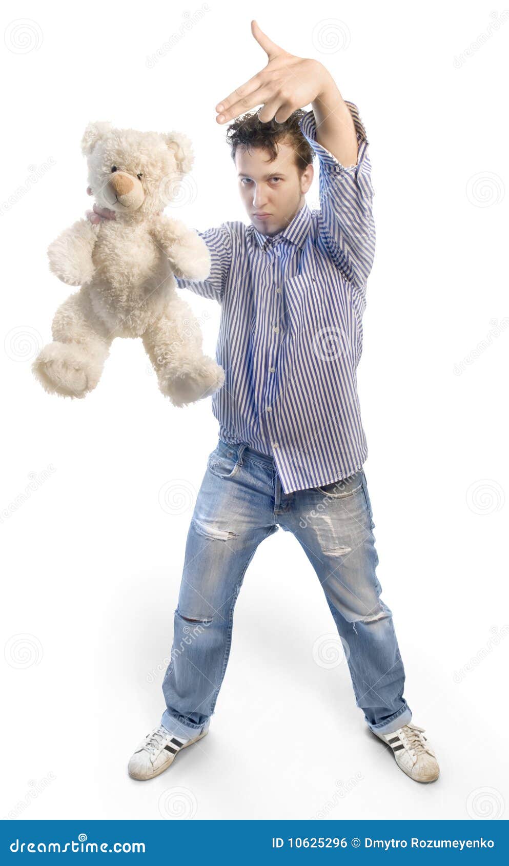 Young man with a teddy stock photo. Image of bear, show - 10625296