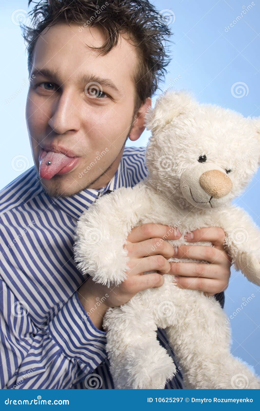 Young man with a teddy stock image. Image of little, head - 10625297