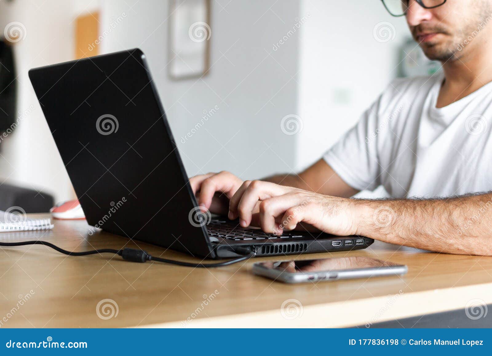 Young Man Telecommuting from Home Stock Photo - Image of latin, work ...