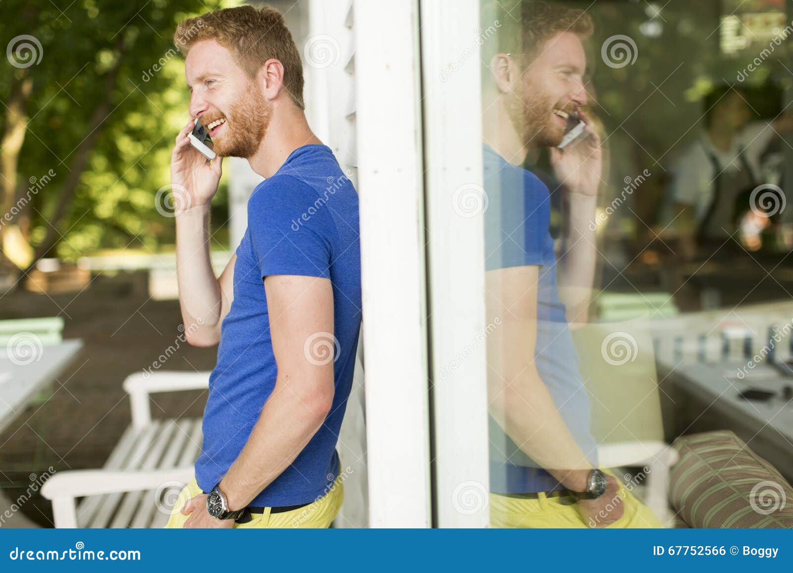 Young man with telephone stock photo. Image of relaxation - 67752566