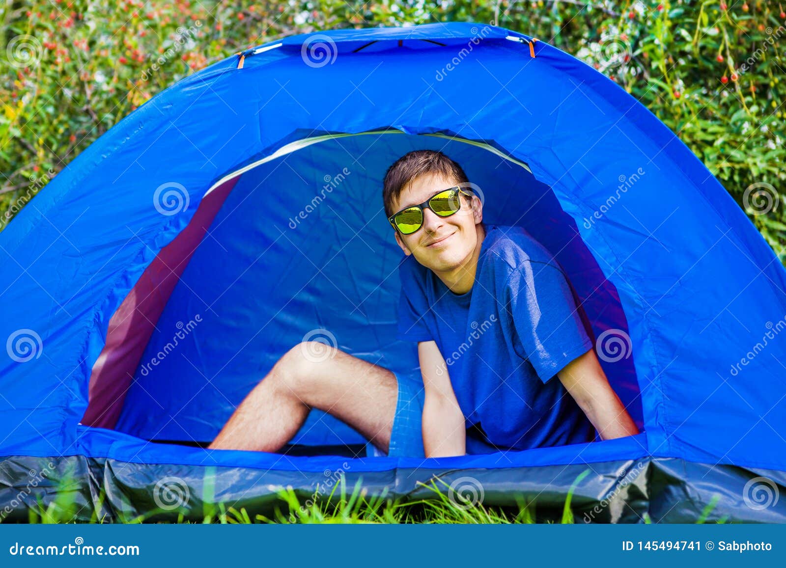 Young Man in the Tent stock image. Image of bush, solitary - 145494741