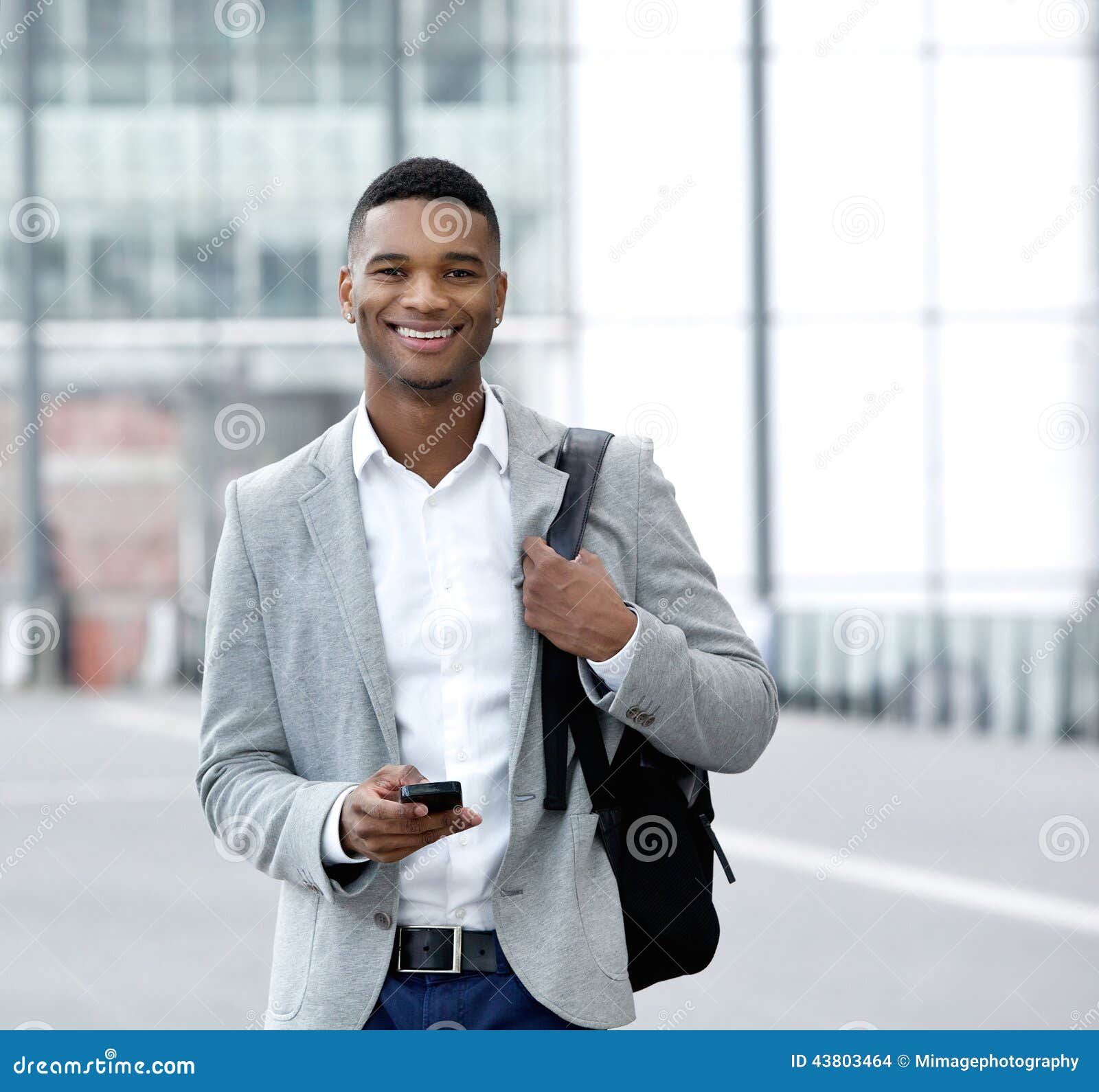 Young Man Text Messaging on Mobile Phone Stock Photo - Image of ...