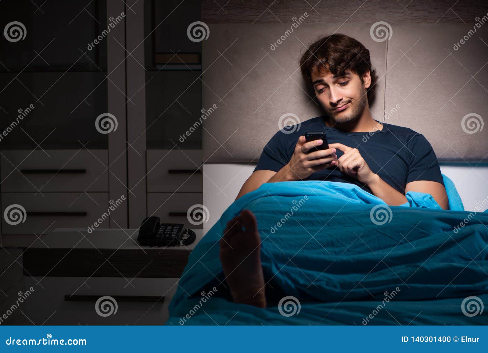 The Young Man Texting on Mobile Late at Night Stock Photo - Image of ...