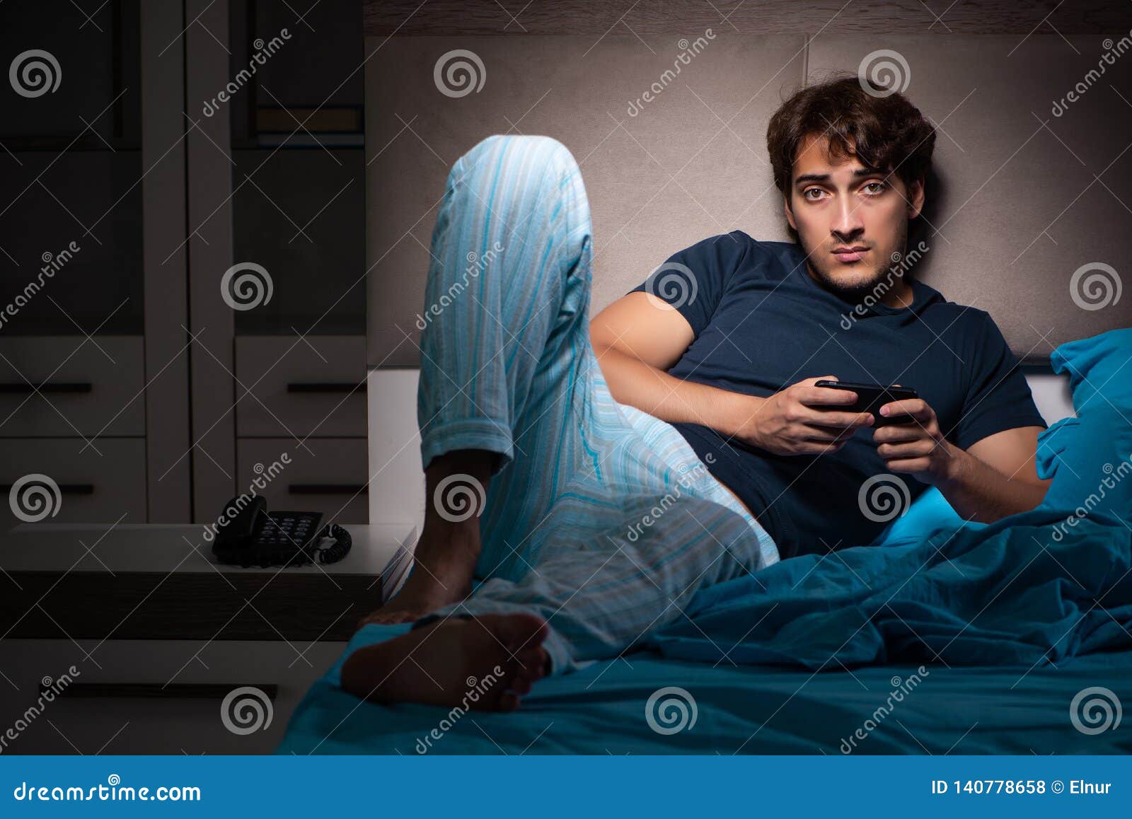 The Young Man Texting on Mobile Late at Night Stock Photo - Image of ...