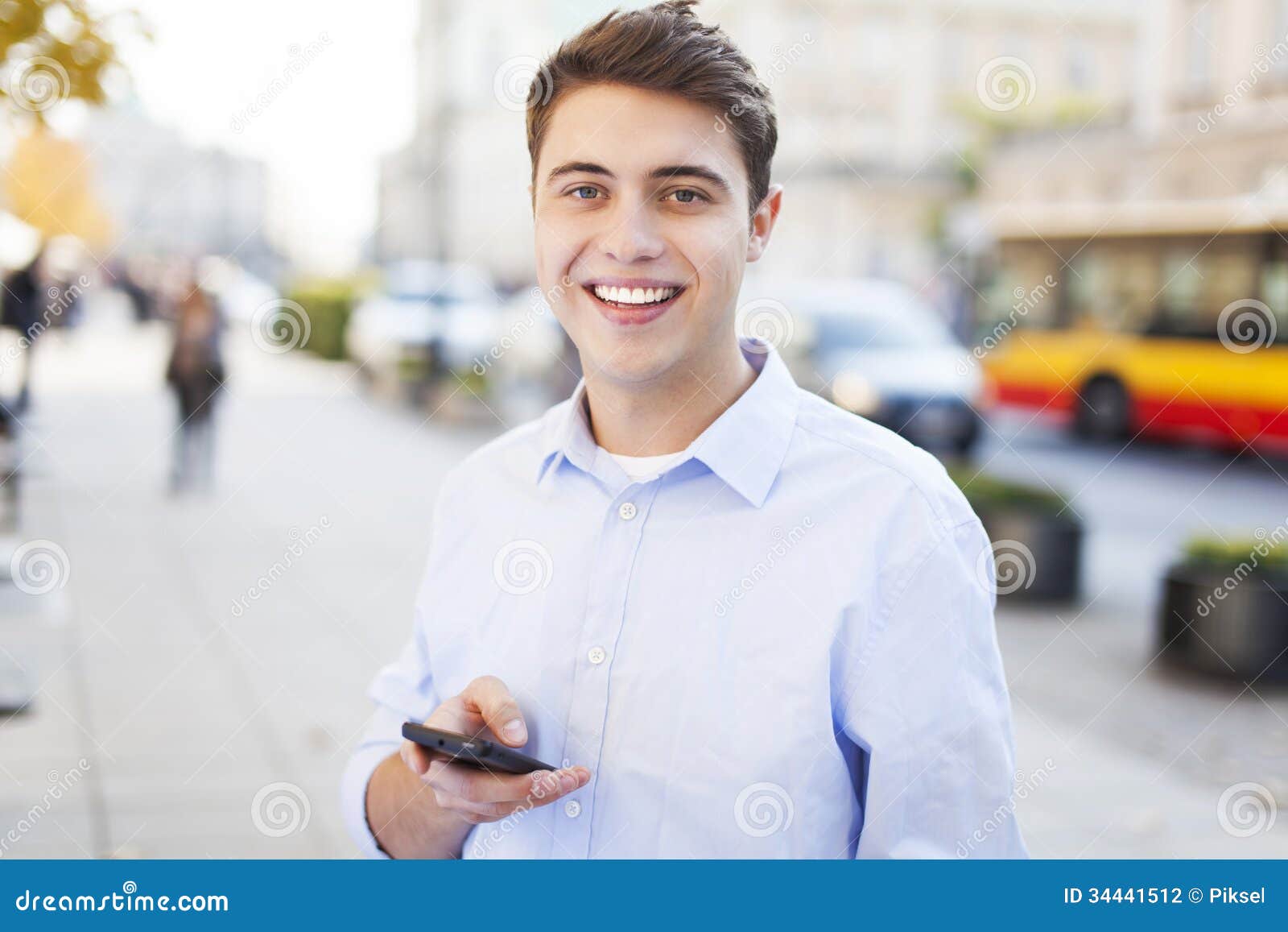 Young man texting stock photo. Image of urban, young - 34441512 Young man texting stock photo. Image of urban, young - 34441512