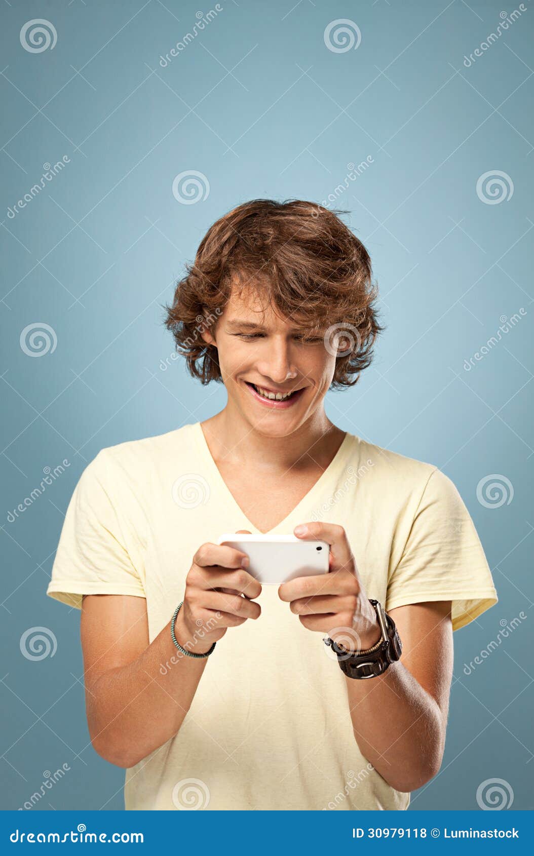 Young Man Texting stock photo. Image of mobile, front - 30979118