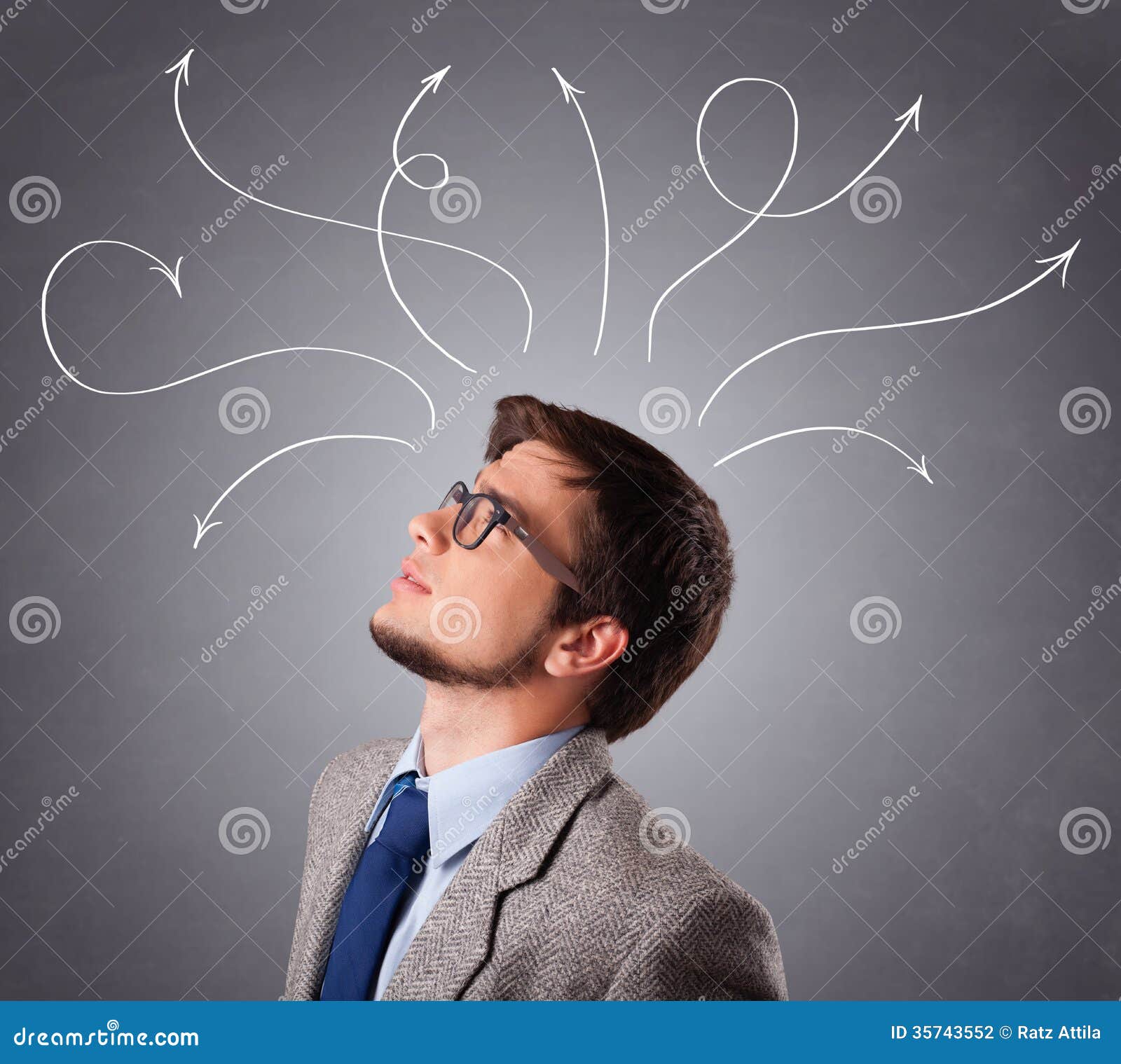 Young Man Thinking with Arrows Overhead Stock Photo - Image of ...