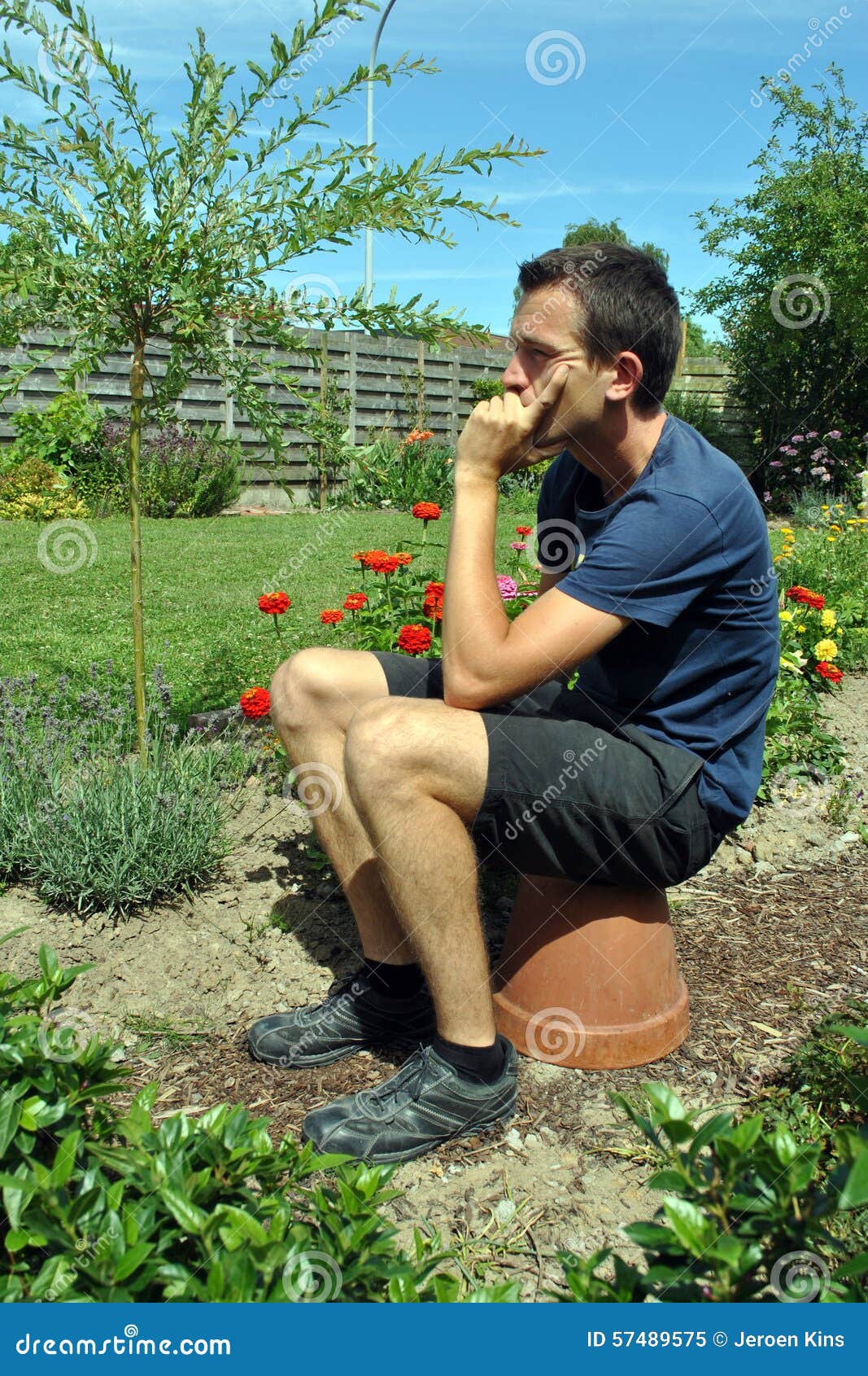 Young Man Thinking in the Garden Stock Image - Image of flower, thought ...