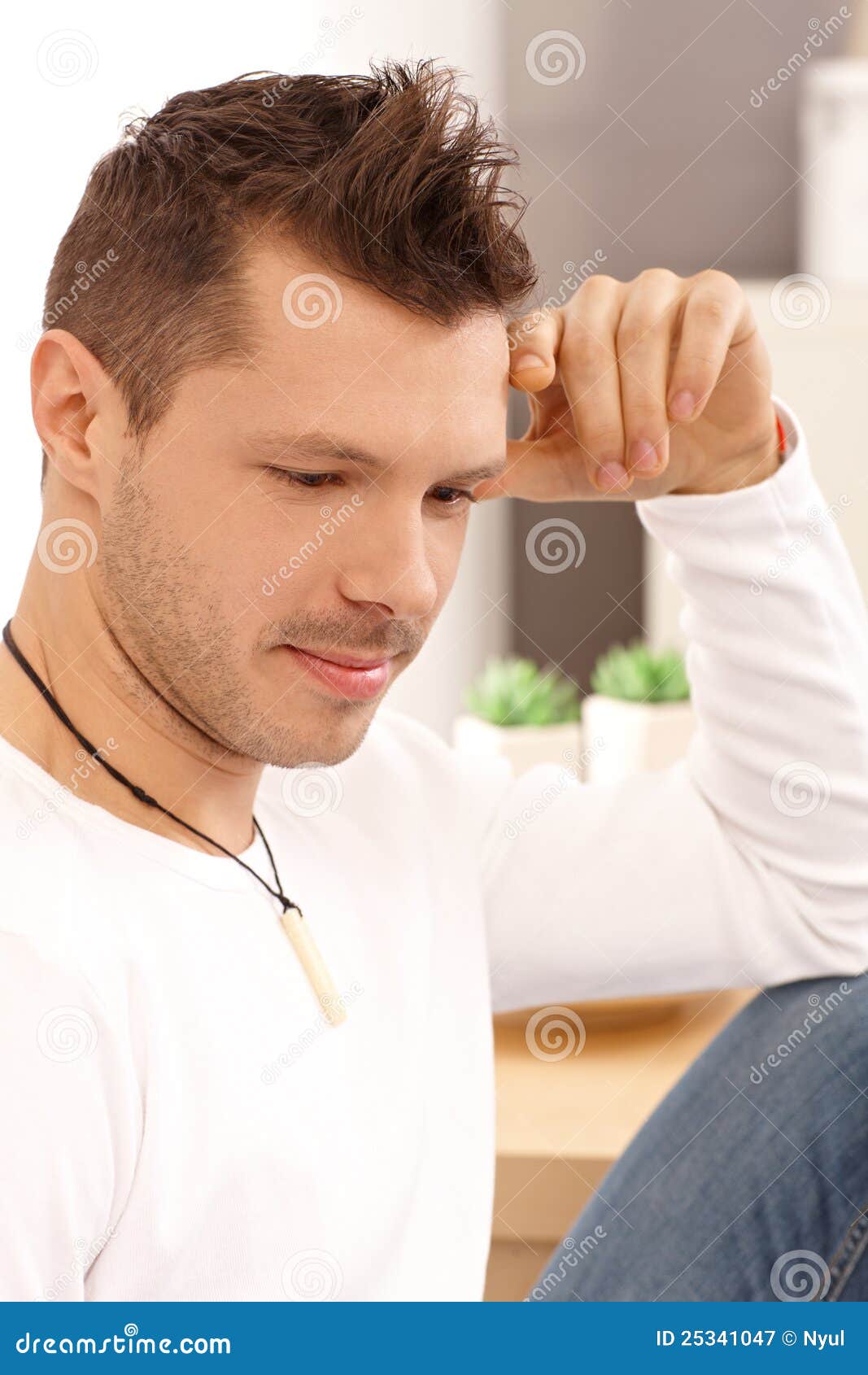 Young man thinking at home stock image. Image of lifestyle - 25341047