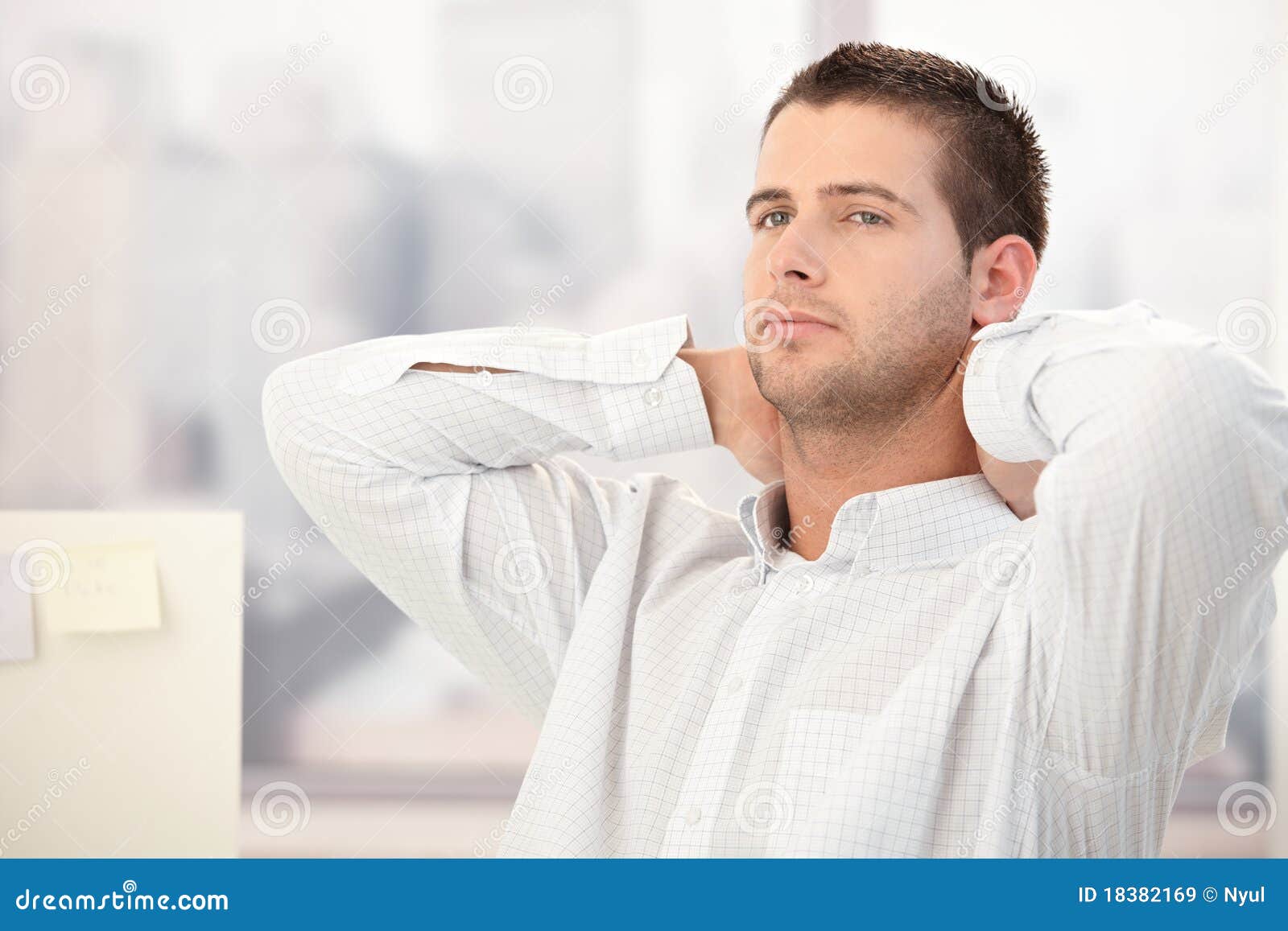 Young Man Thinking in Office Stock Image - Image of consideration ...