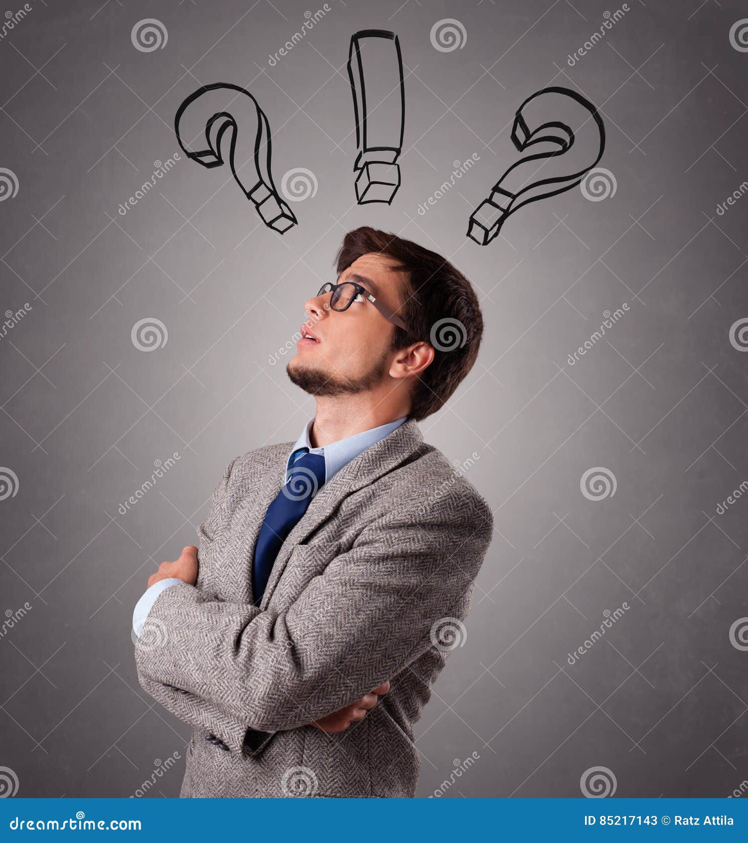 Young Man Thinking with Question Marks Overhead Stock Image - Image of ...