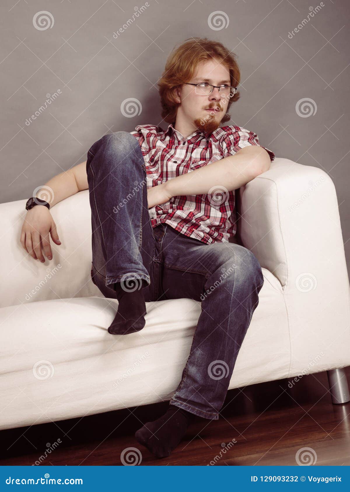 Young Man Thinking and Sitting Stock Photo - Image of sitting, thinking ...