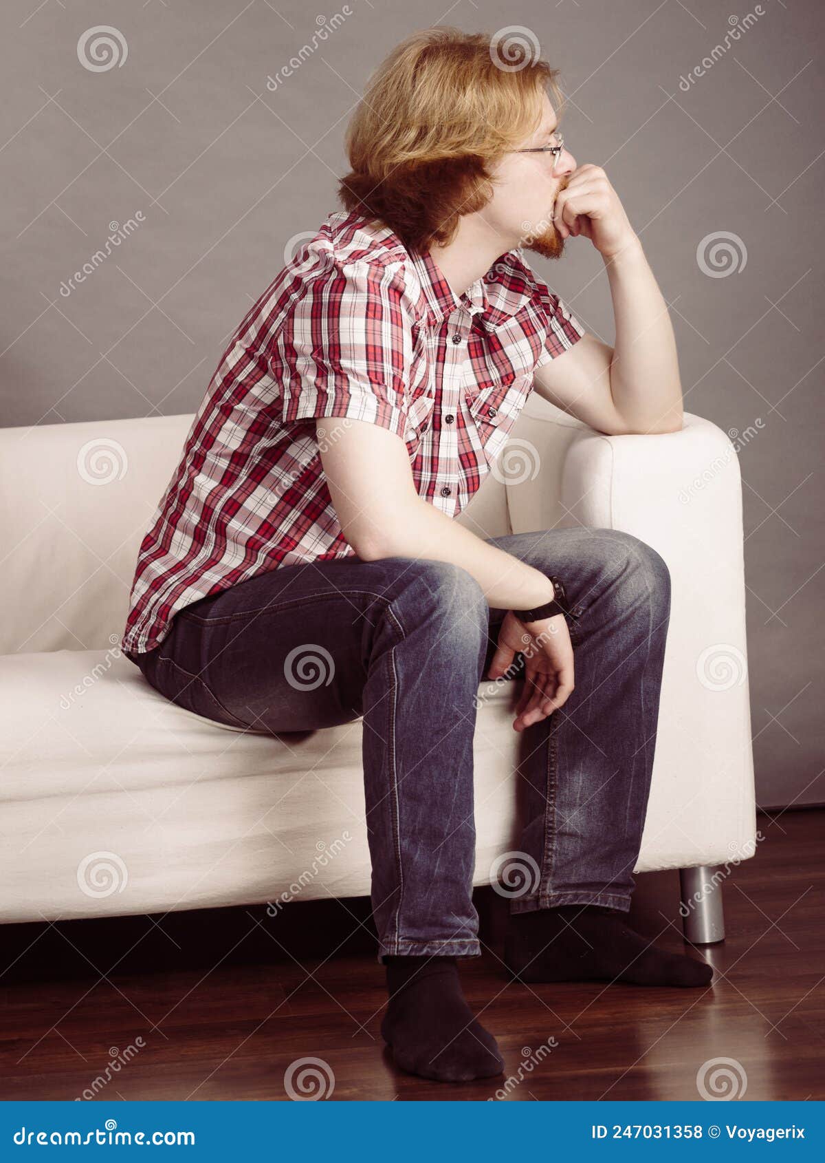 Young Man Thinking and Sitting Stock Photo - Image of contemplation ...