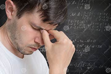 Young Man in Thinking. Solving a Difficult Math Problem Stock Image ...