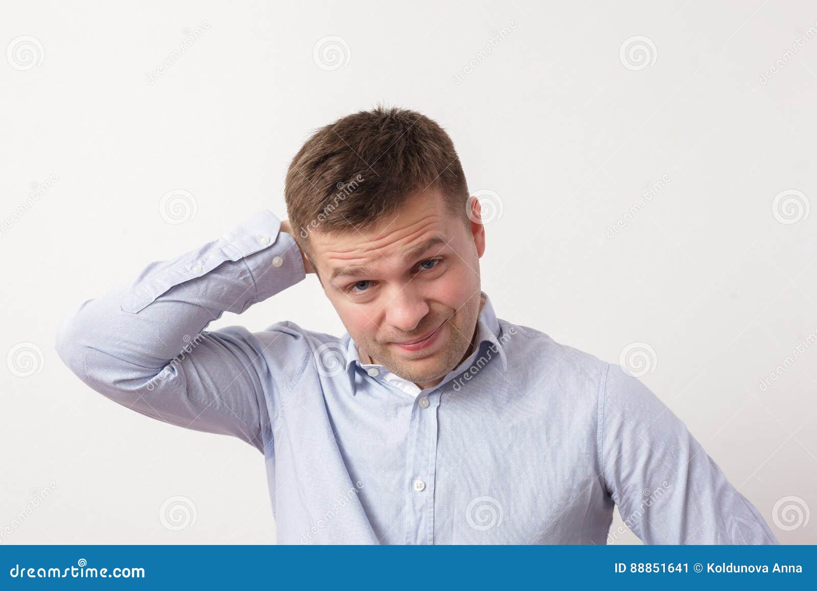 Young Man Thinking About Something Difficult, Compressing His Lips ...